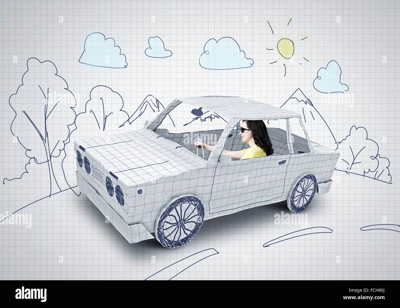 Young woman riding car made of list of paper Stock Photo - Alamy