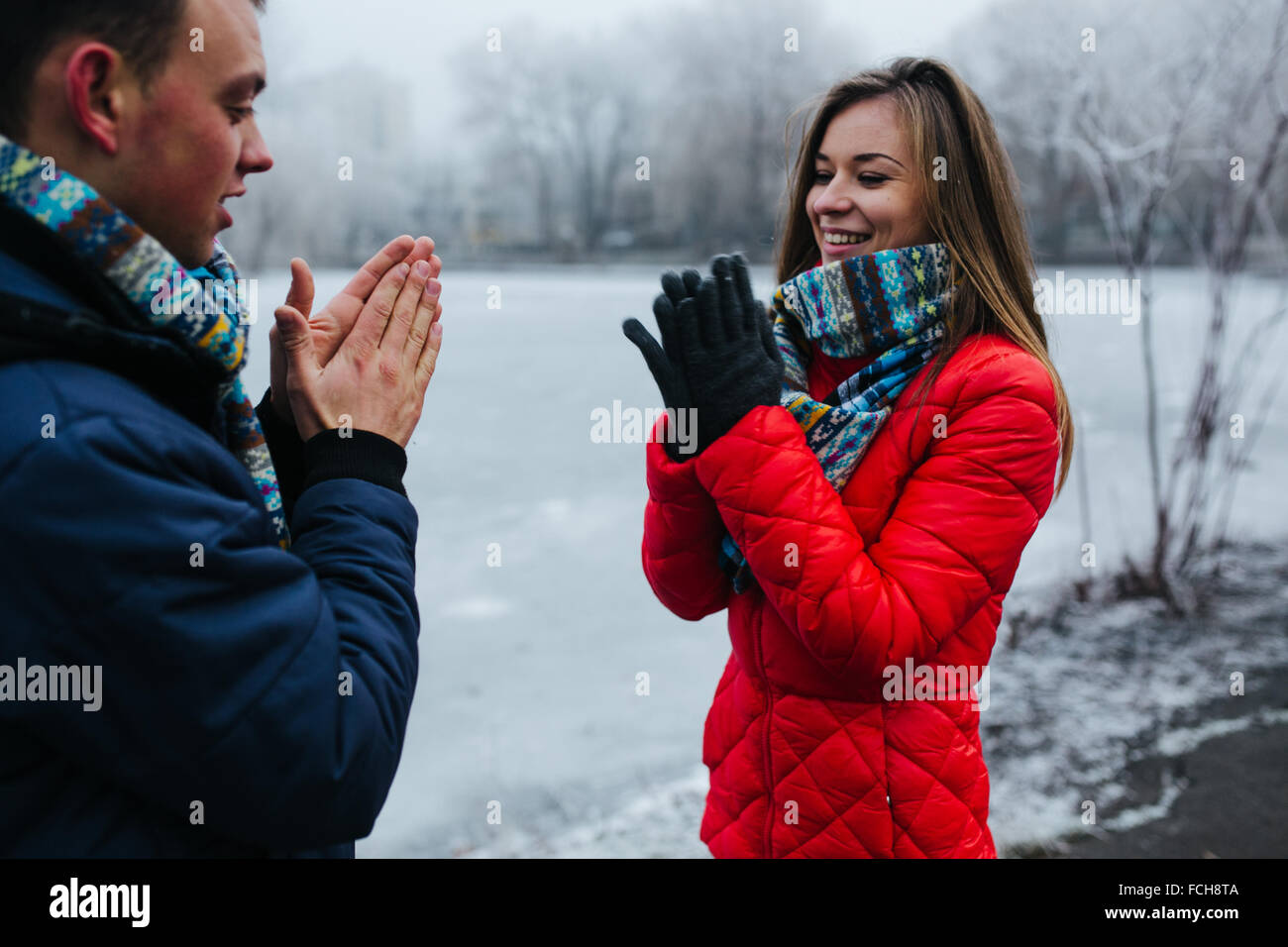 Two young women clapping their hands hi-res stock photography and ...