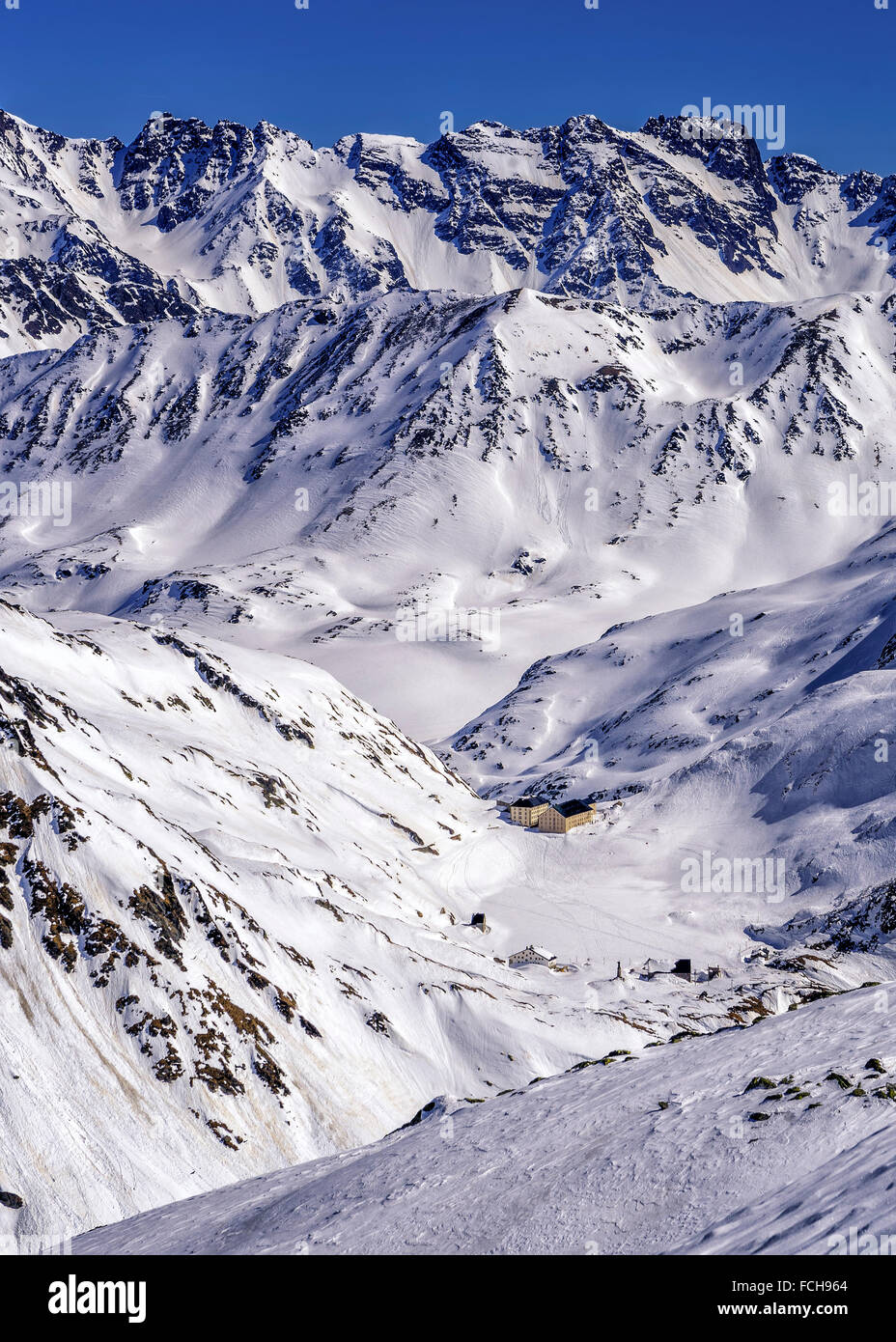 Snow covered mountain range with monastery hi-res stock photography and ...