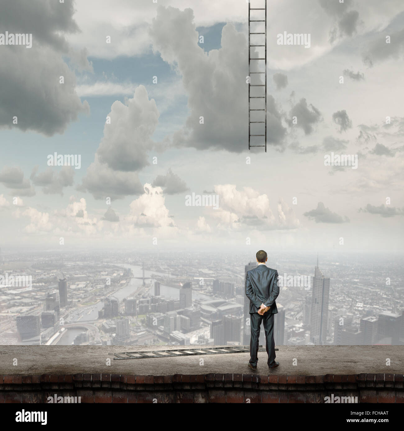 Rear view of businessman and broken ladder to sky Stock Photo - Alamy