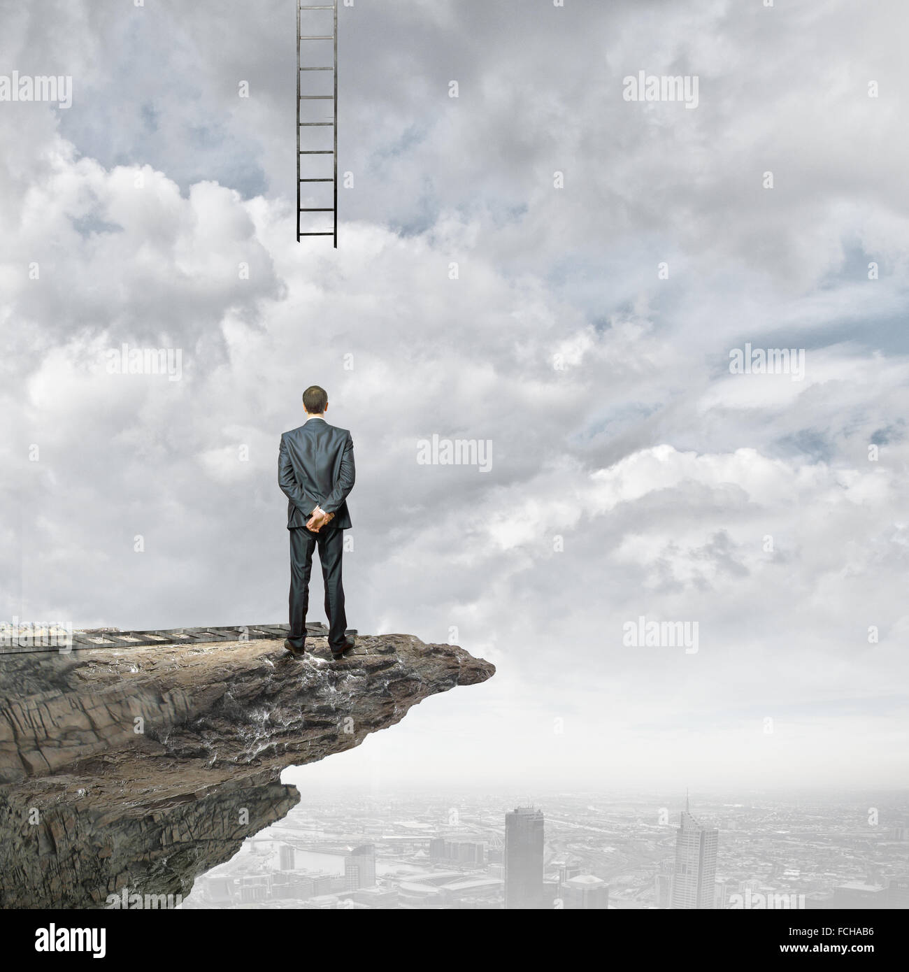 Rear view of businessman and broken ladder to sky Stock Photo - Alamy
