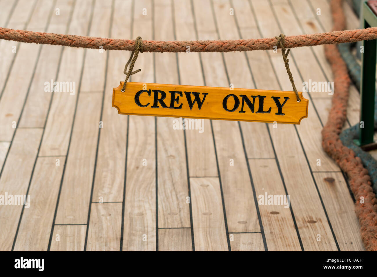 Sign on sailing ship, crew only Stock Photo - Alamy