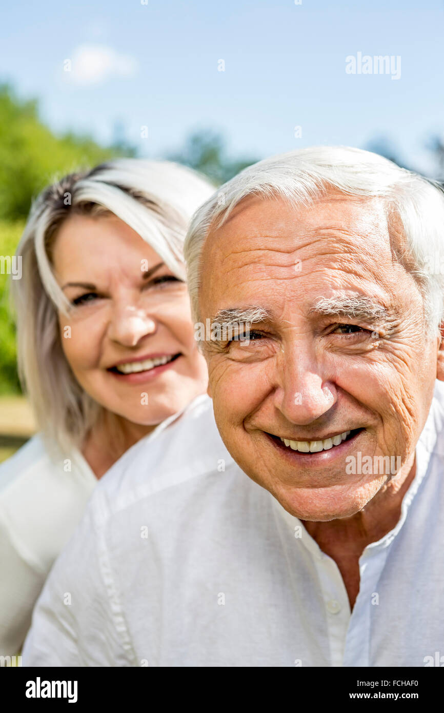 Portrait of happy elderly couple outdoors Stock Photo - Alamy