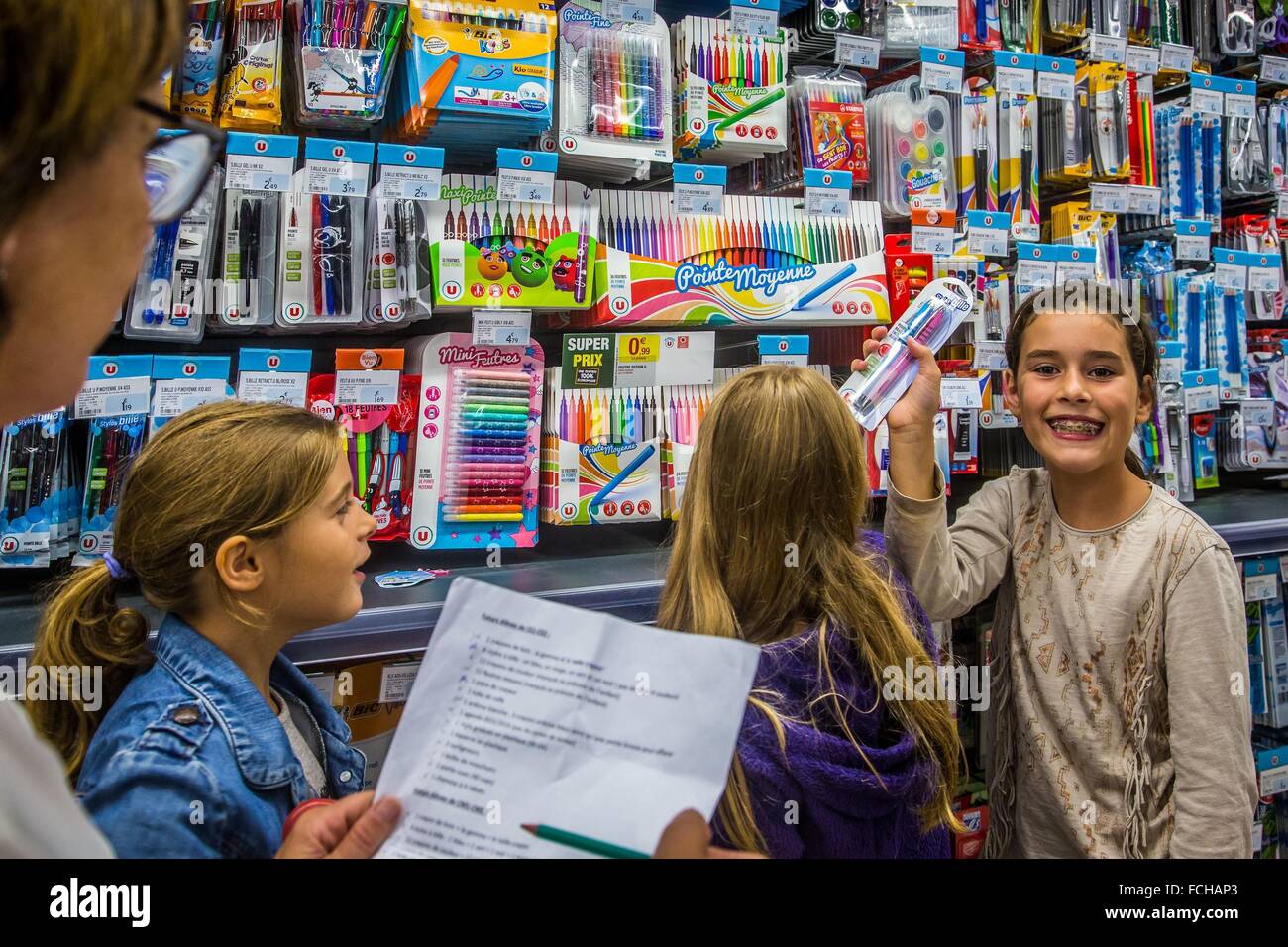 BACK-TO-SCHOOL ILLUSTRATION, BUYING SCHOOL SUPPLIES AT A SUPERMARKET ...
