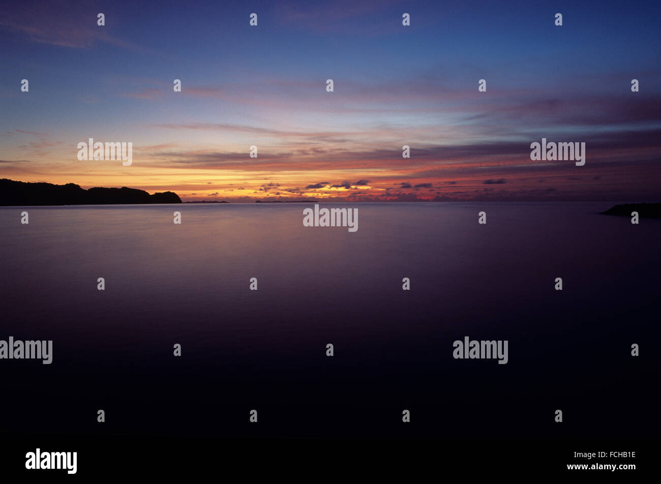 Sunset in the Republic of Palau, an island country in the western chain ...