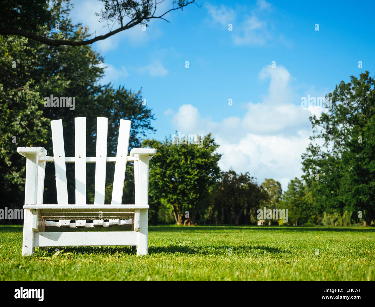 Germany, Hamburg, empty white lawn chair in a park Stock Photo - Alamy