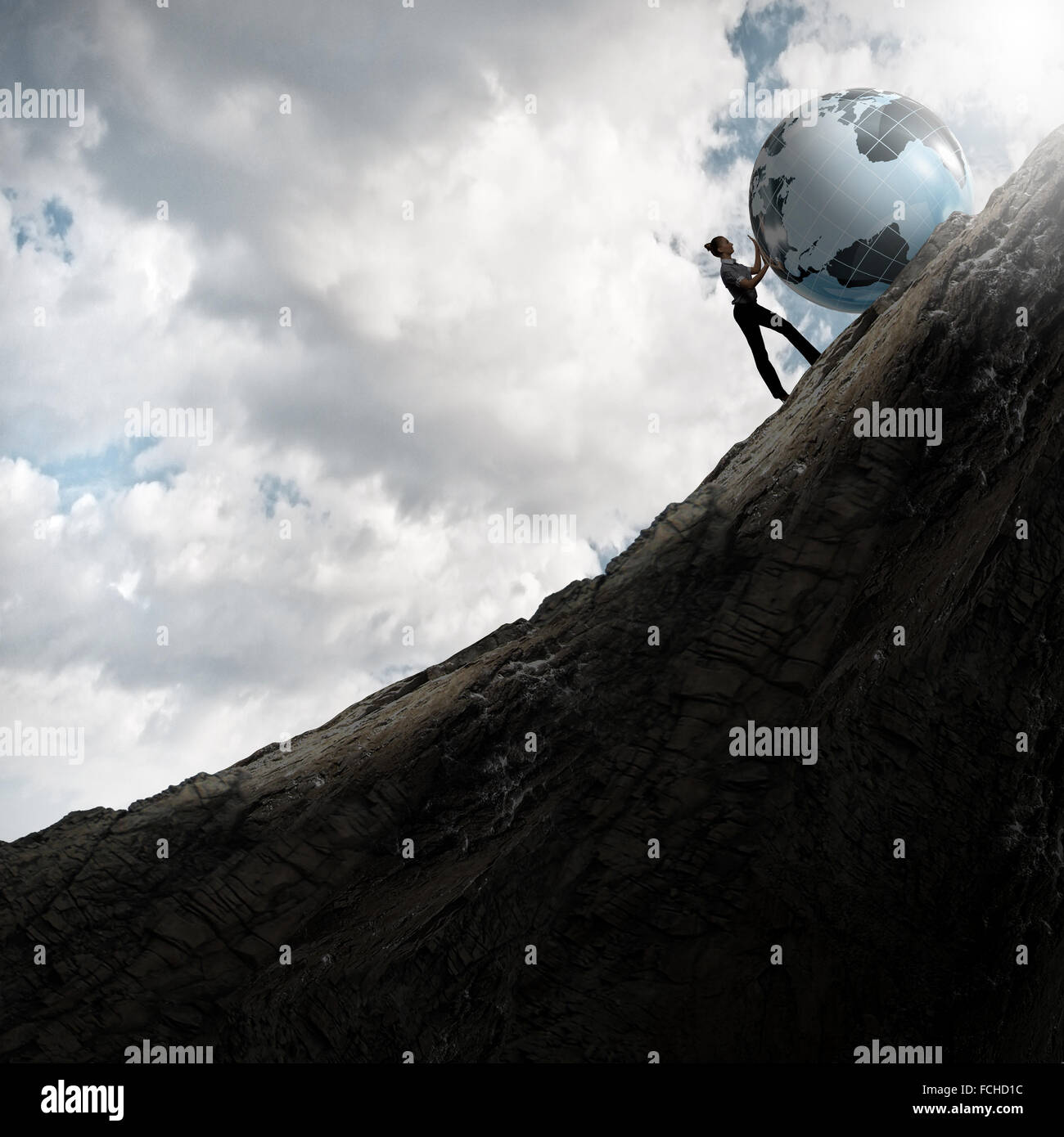 Businesswoman rolling Earth planet up the hill Stock Photo - Alamy