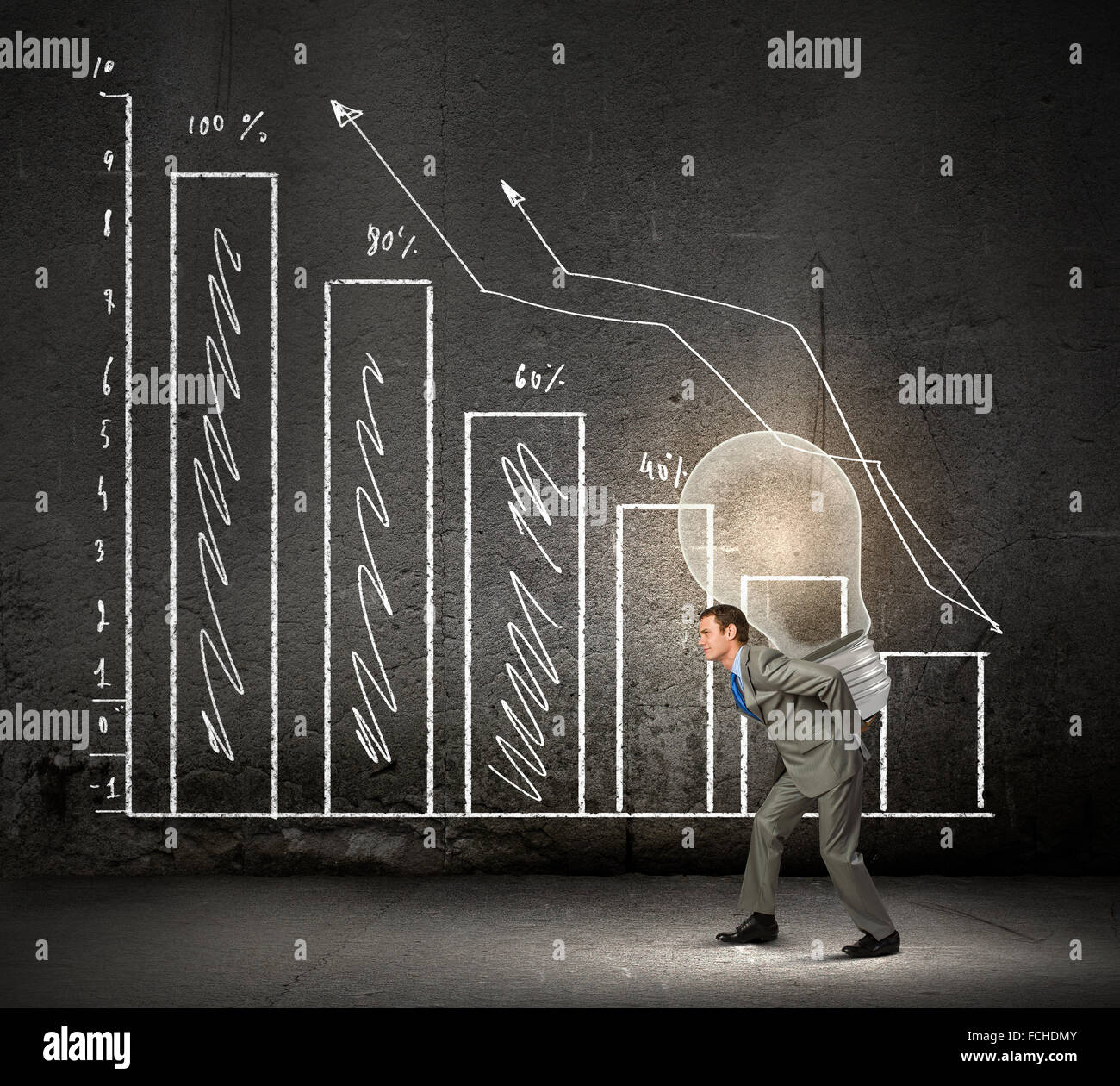 Young businessman carrying light bulb on back Stock Photo - Alamy