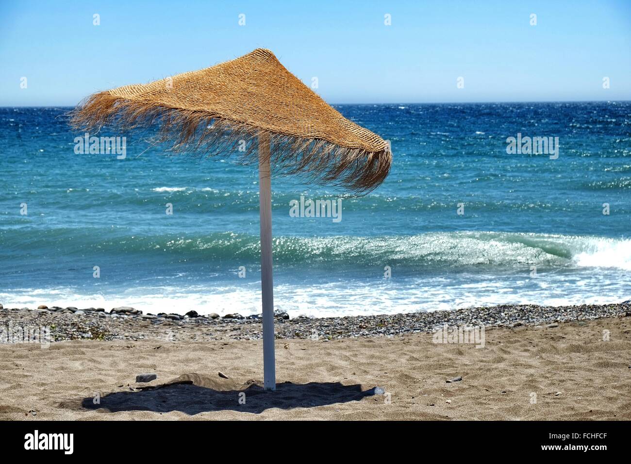 Rustic umbrellas hi-res stock photography and images - Alamy