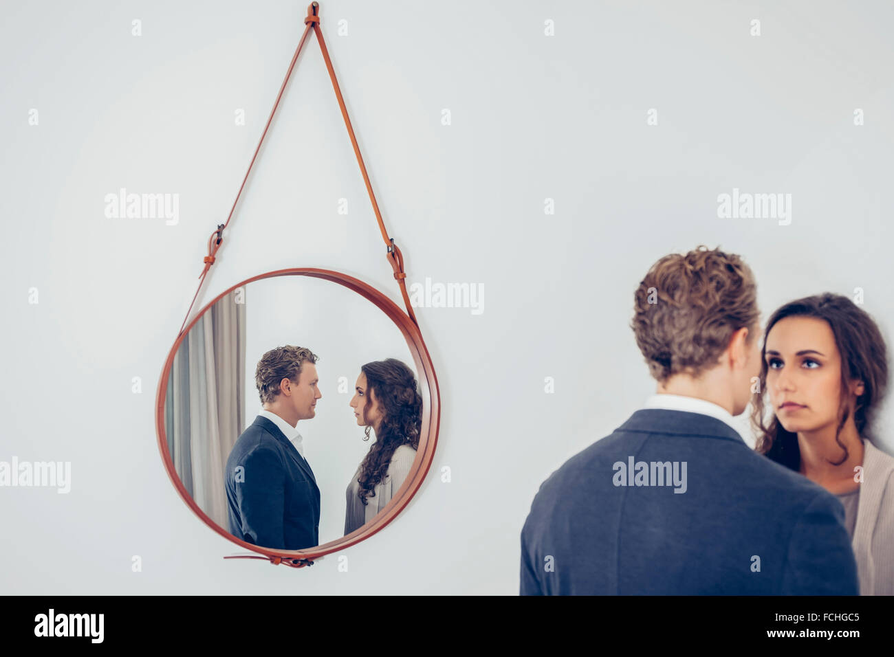 Man staring at reflection in mirror hi-res stock photography and images ...
