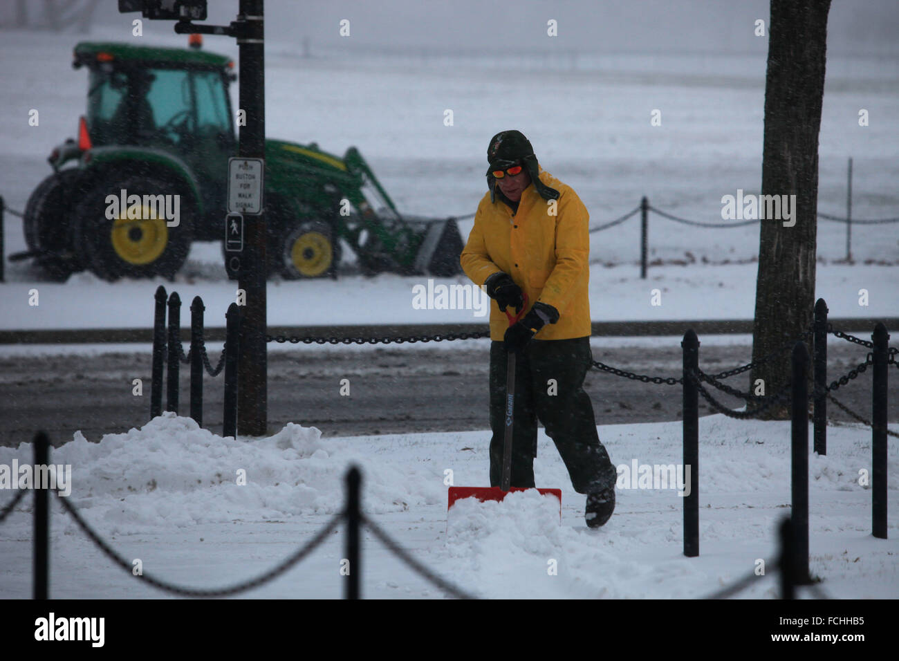 Washington, DC, USA. 22nd Jan, 2016. Workers clear snow near the ...