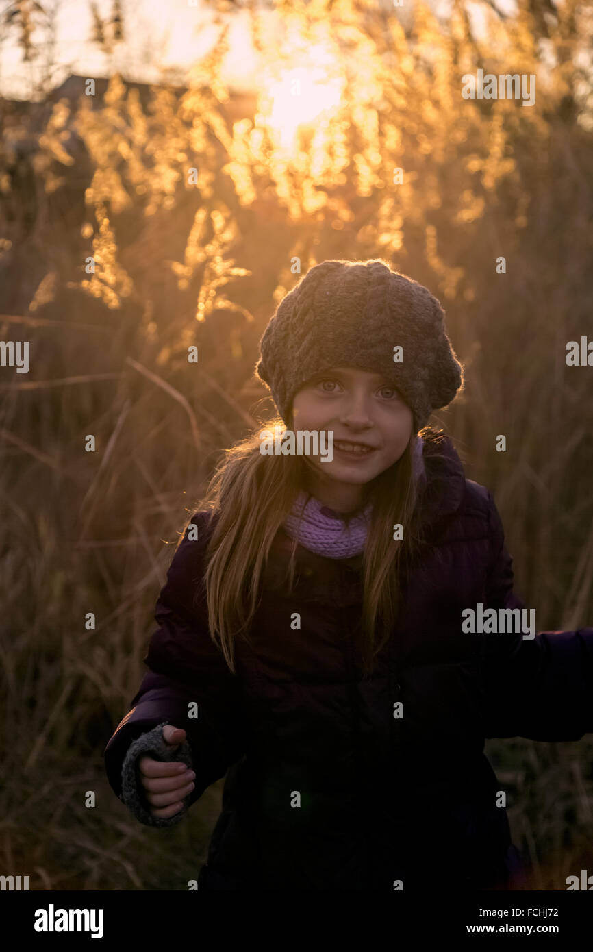 Portrait of girl in autumn at evening twilight Stock Photo - Alamy