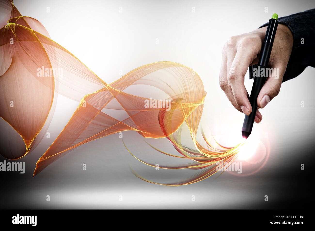 Close up of designer hand drawing colorful loops Stock Photo - Alamy
