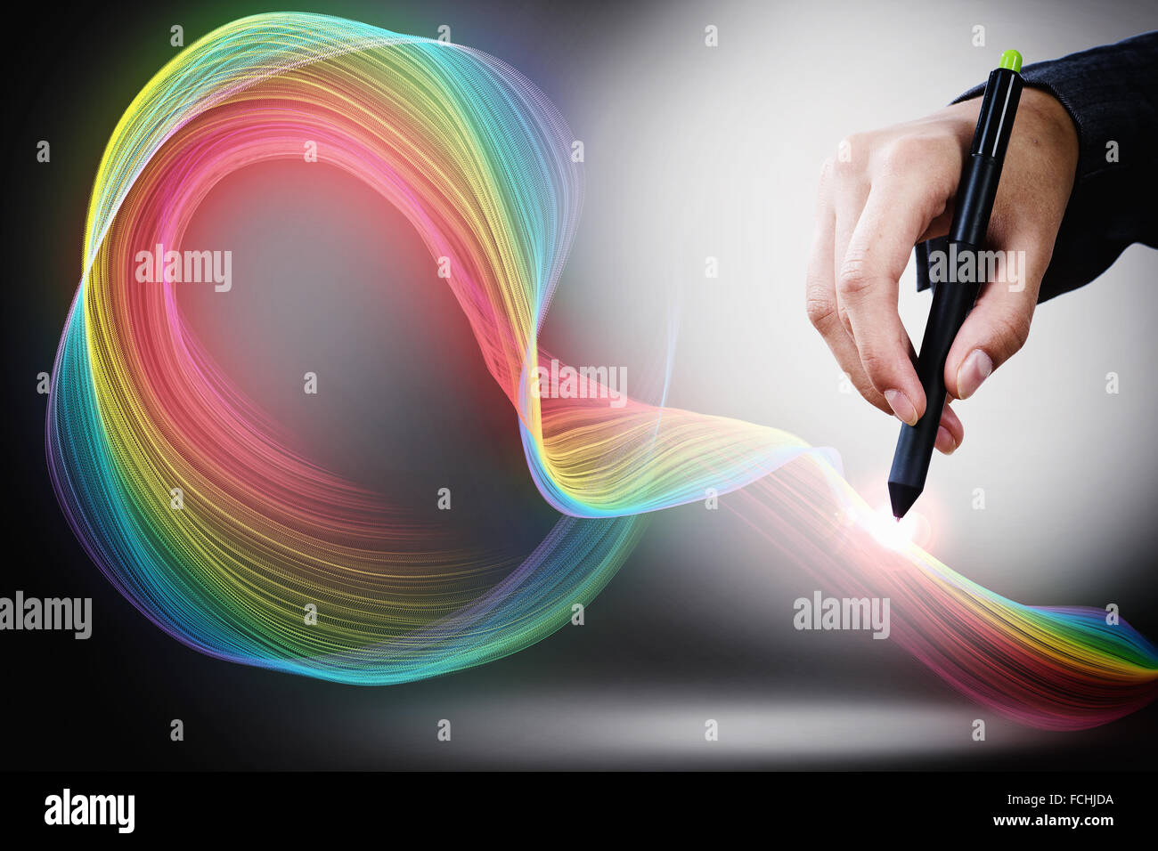 Close up of designer hand drawing colorful loops Stock Photo - Alamy