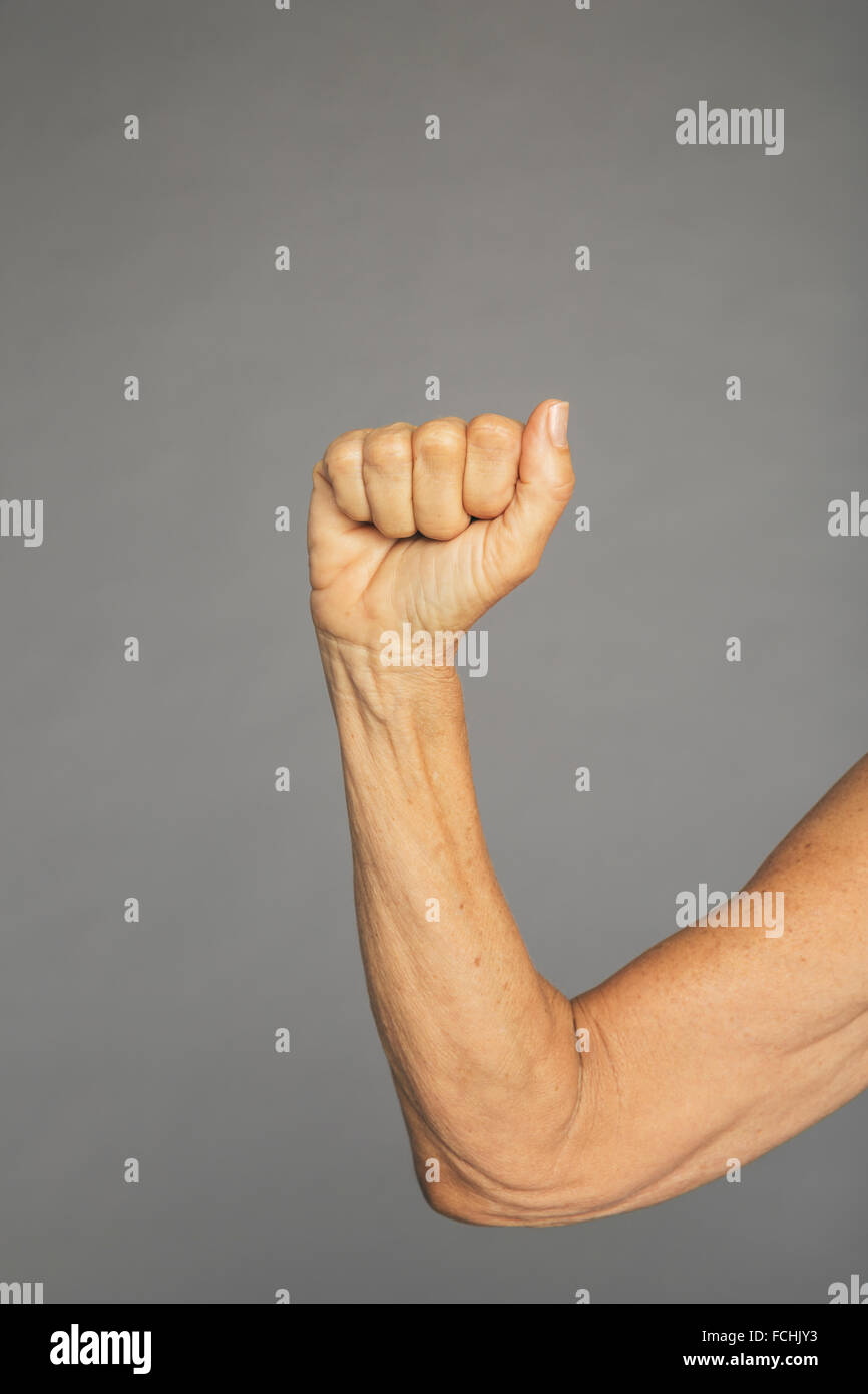 Mature woman Hand and fingers stretching exercise Stock Photo - Alamy