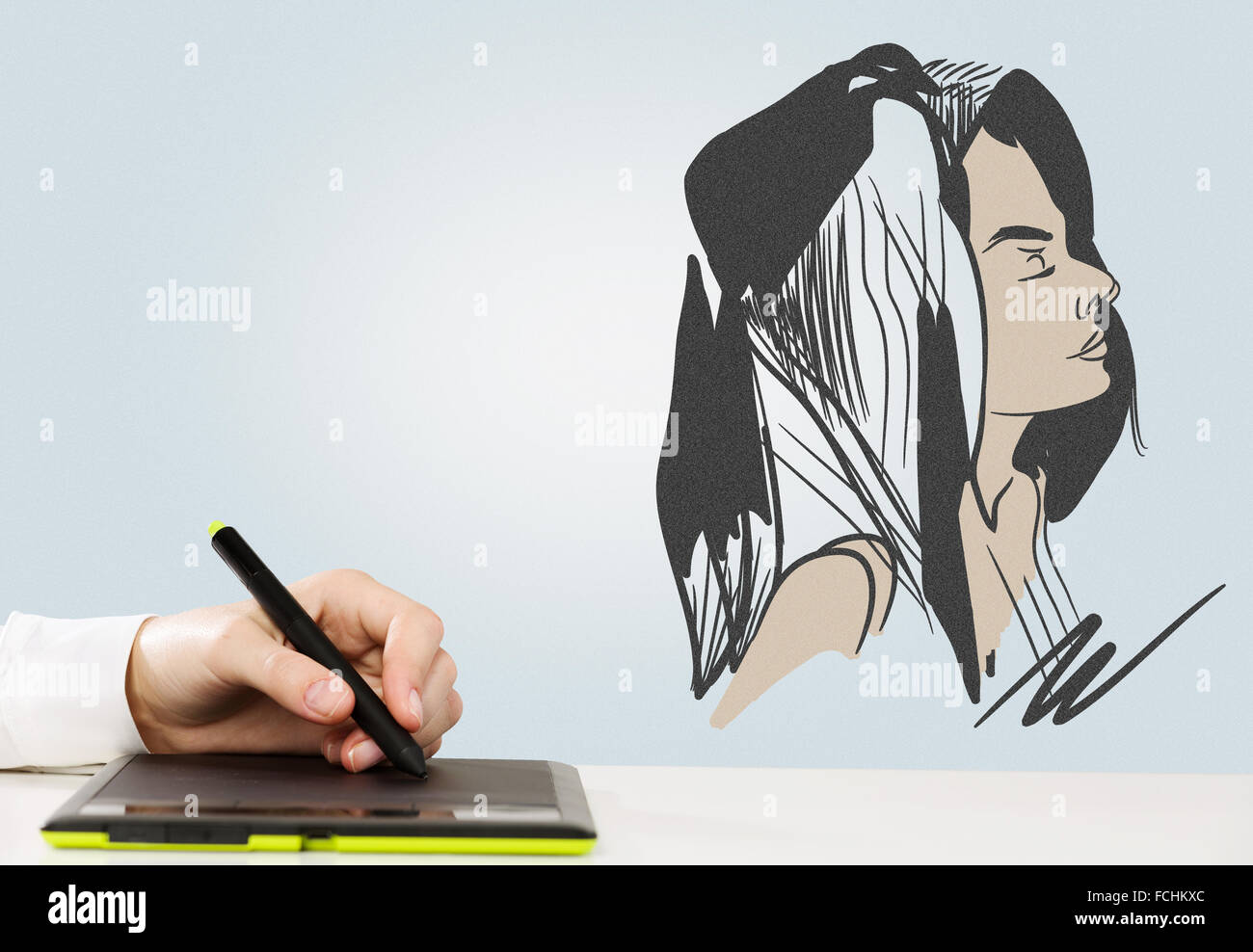 Close up of human hand using tablet for drawing Stock Photo - Alamy