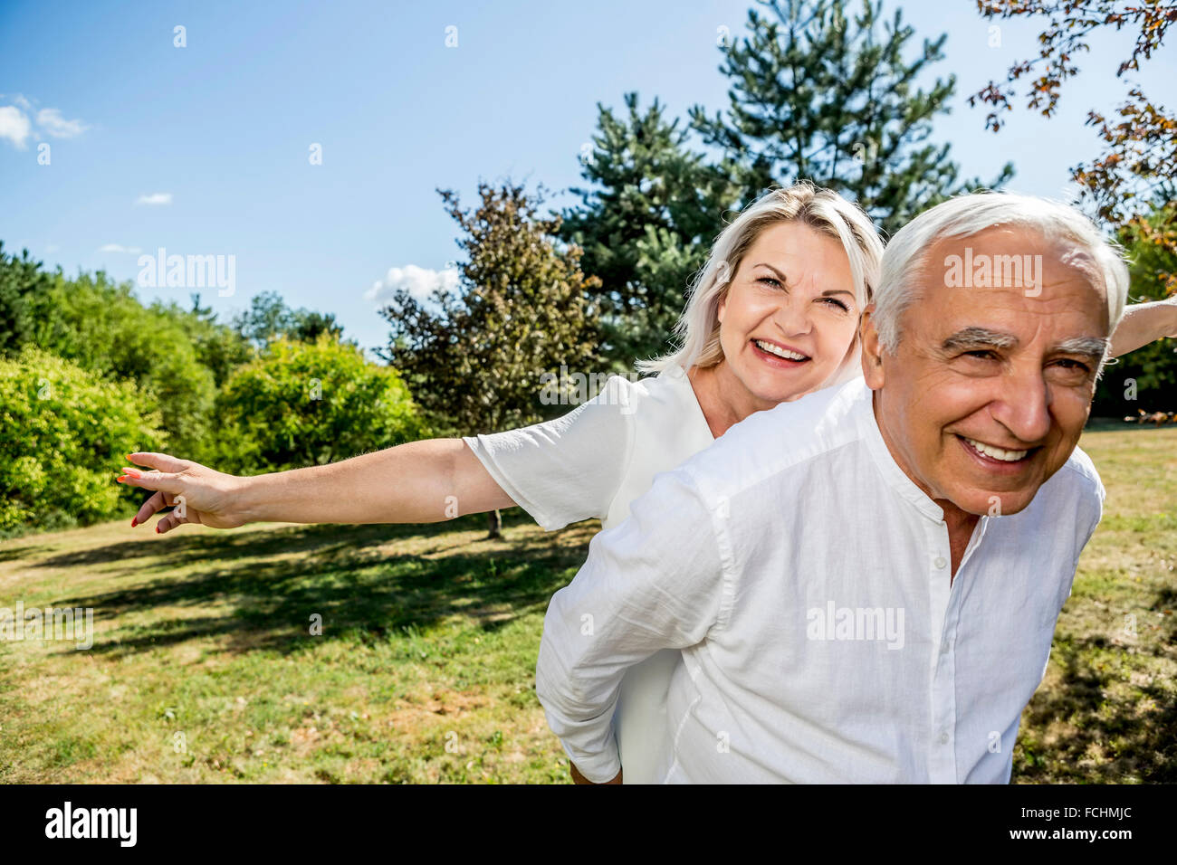 Portrait of happy elderly couple outdoors Stock Photo - Alamy