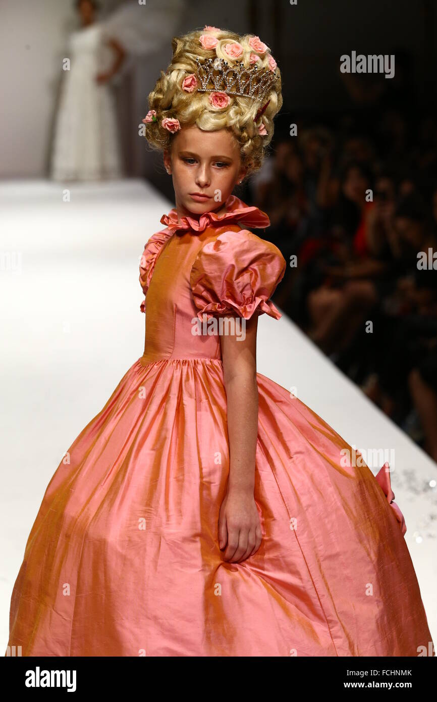 A kid model walks the runway at the Nancy Vuu fashion show during ...