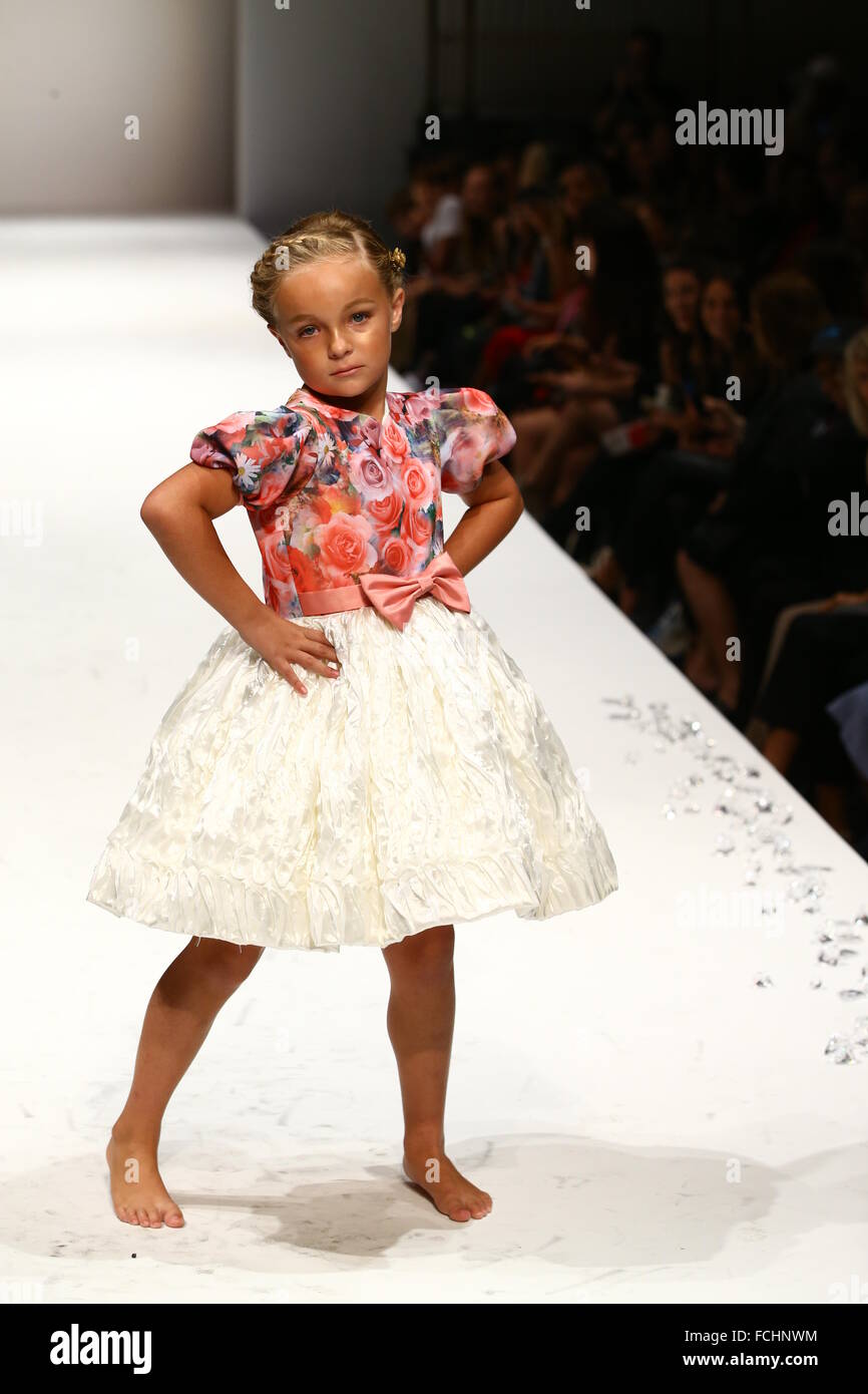 A kid model walks the runway at the Nancy Vuu fashion show during ...