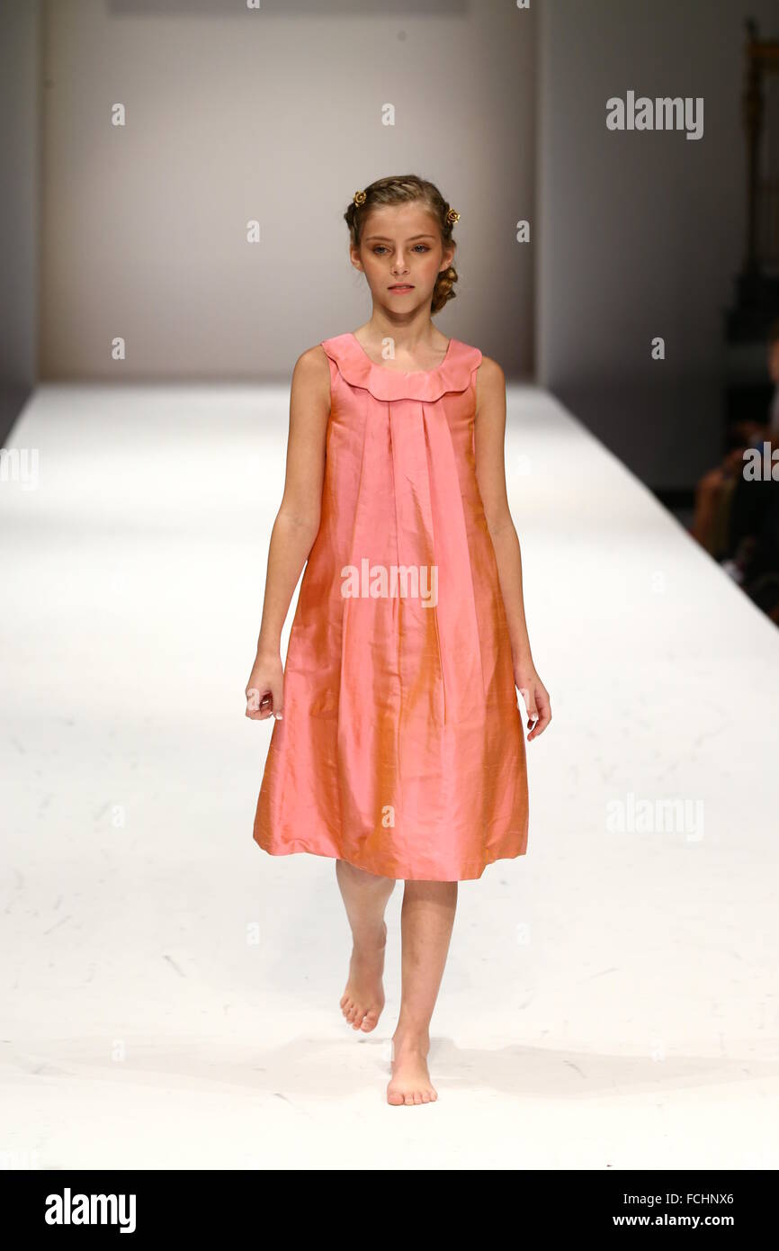 A kid model walks the runway at the Nancy Vuu fashion show during ...