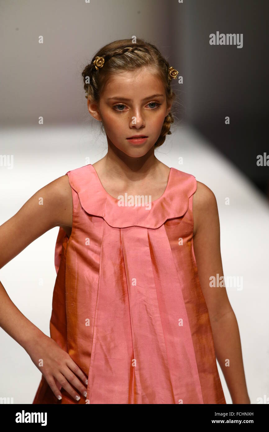 A kid model walks the runway at the Nancy Vuu fashion show during ...