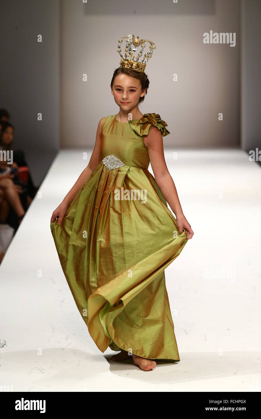A kid model walks the runway at the Nancy Vuu fashion show during ...