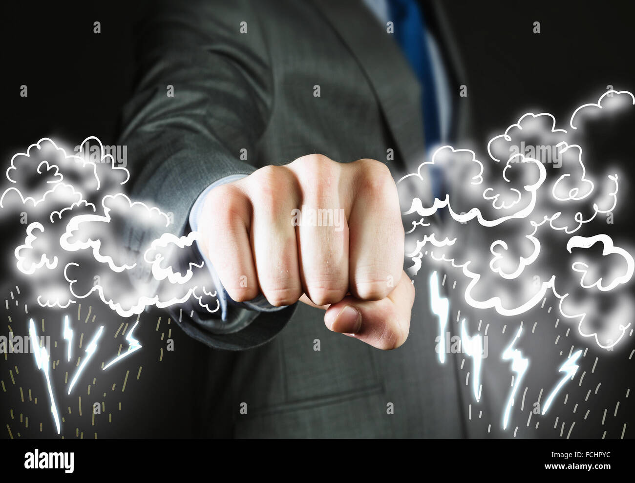 Close up of businessman hand holding lightning in fist Stock Photo - Alamy