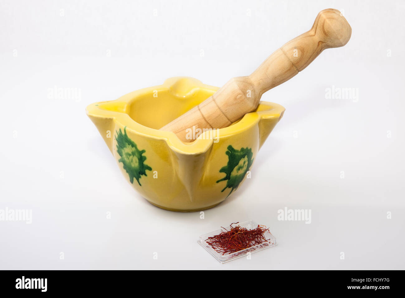 Clay mortar with spanish saffron Isolated on white background Stock ...