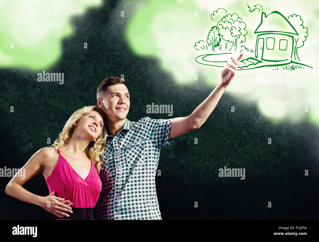Young happy couple dreaming about future home Stock Photo - Alamy