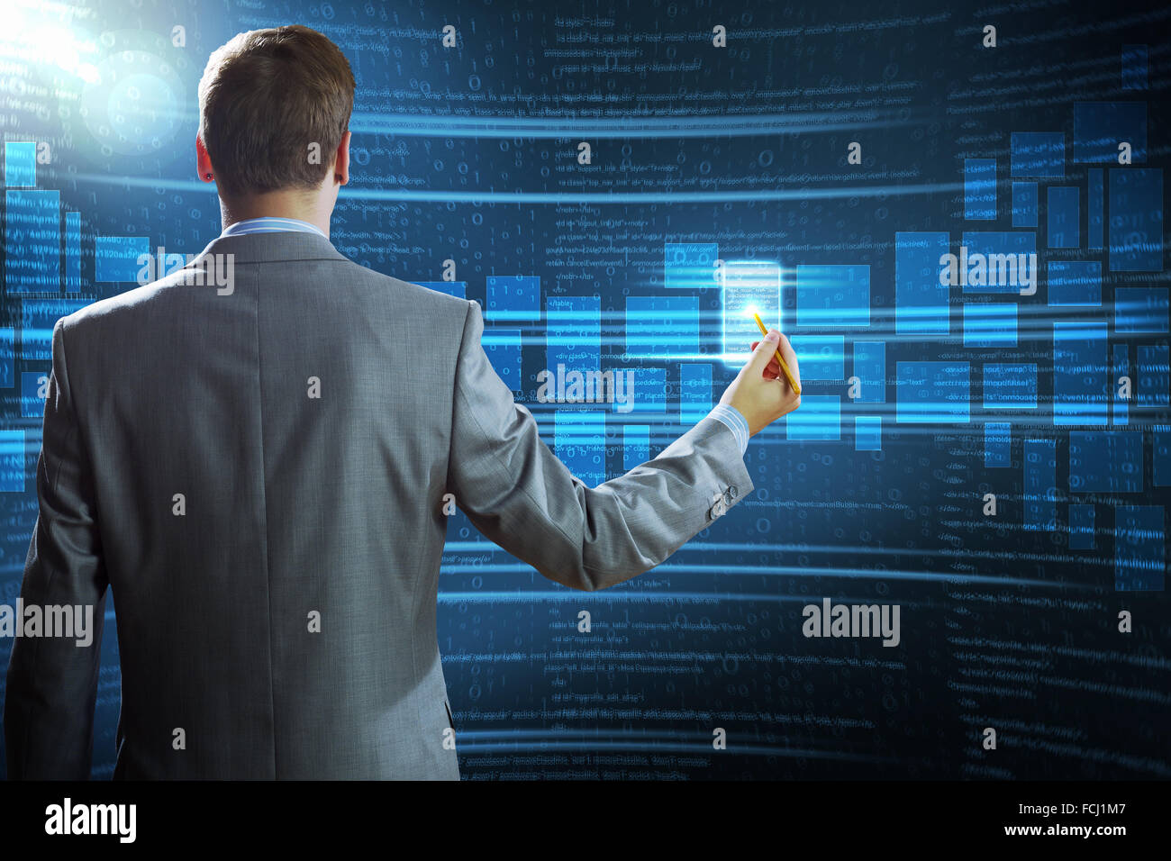 Rear view of businessman touching digital screen Stock Photo - Alamy Rear view of businessman touching digital screen Stock Photo - Alamy