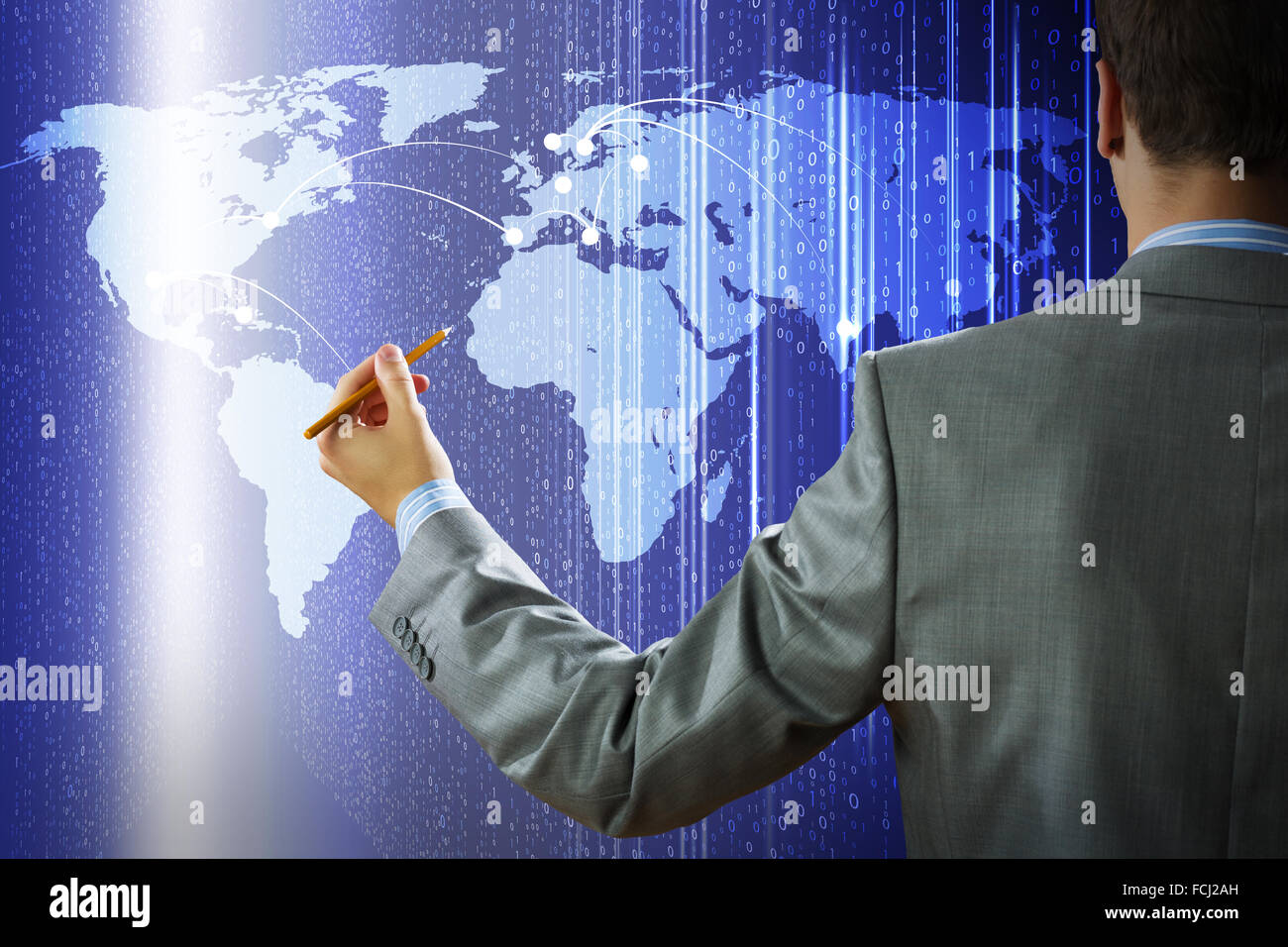 Rear view of businessman touching digital screen Stock Photo - Alamy Rear view of businessman touching digital screen Stock Photo - Alamy