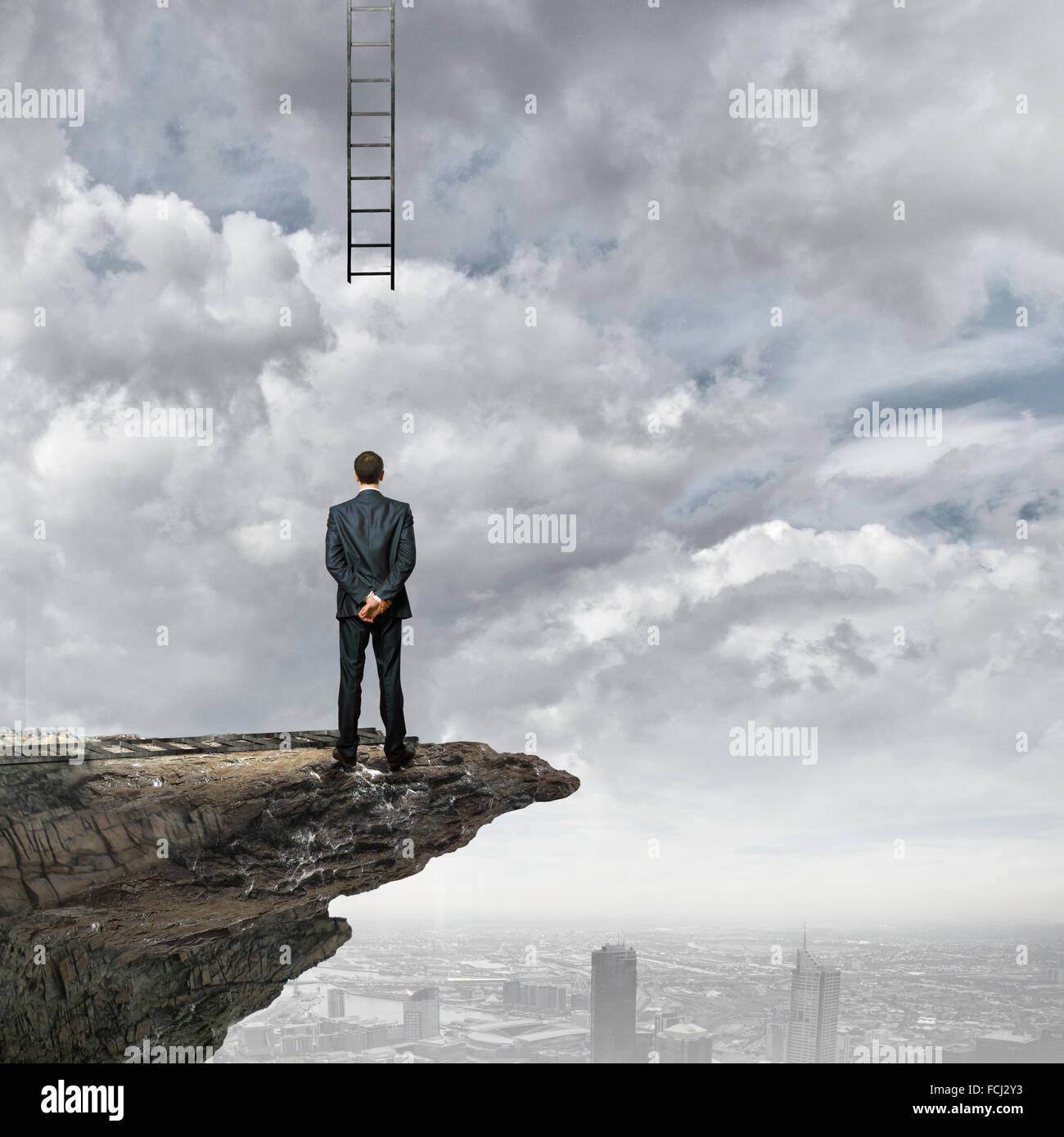 Rear view of businessman and broken ladder going up Stock Photo - Alamy