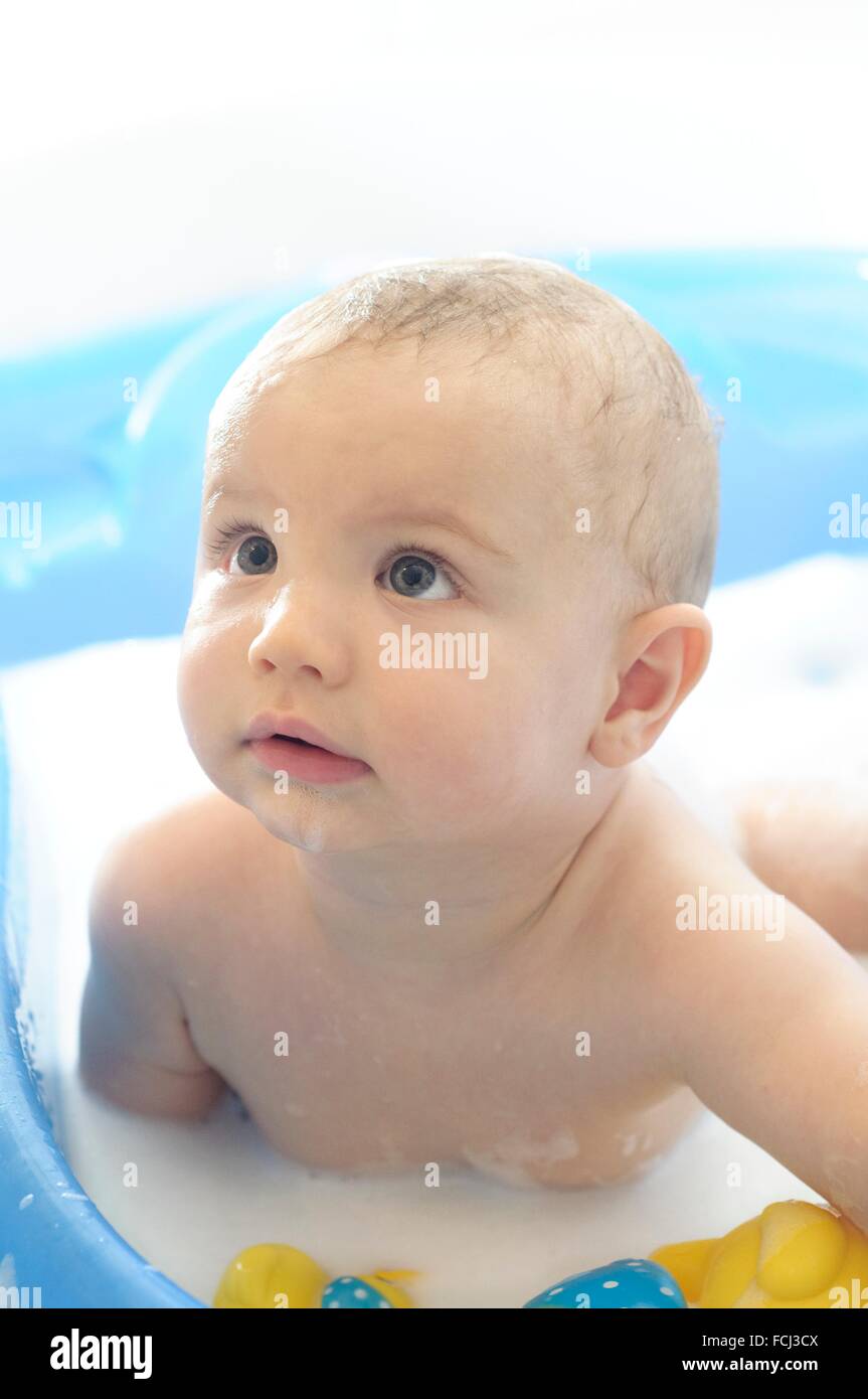 Child with baby duck hi-res stock photography and images - Alamy