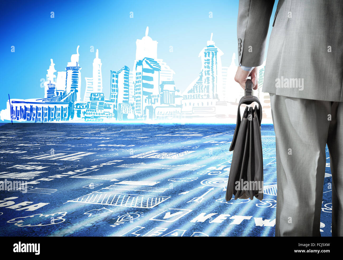 Rear view of businessman with suitcase in hand Stock Photo - Alamy