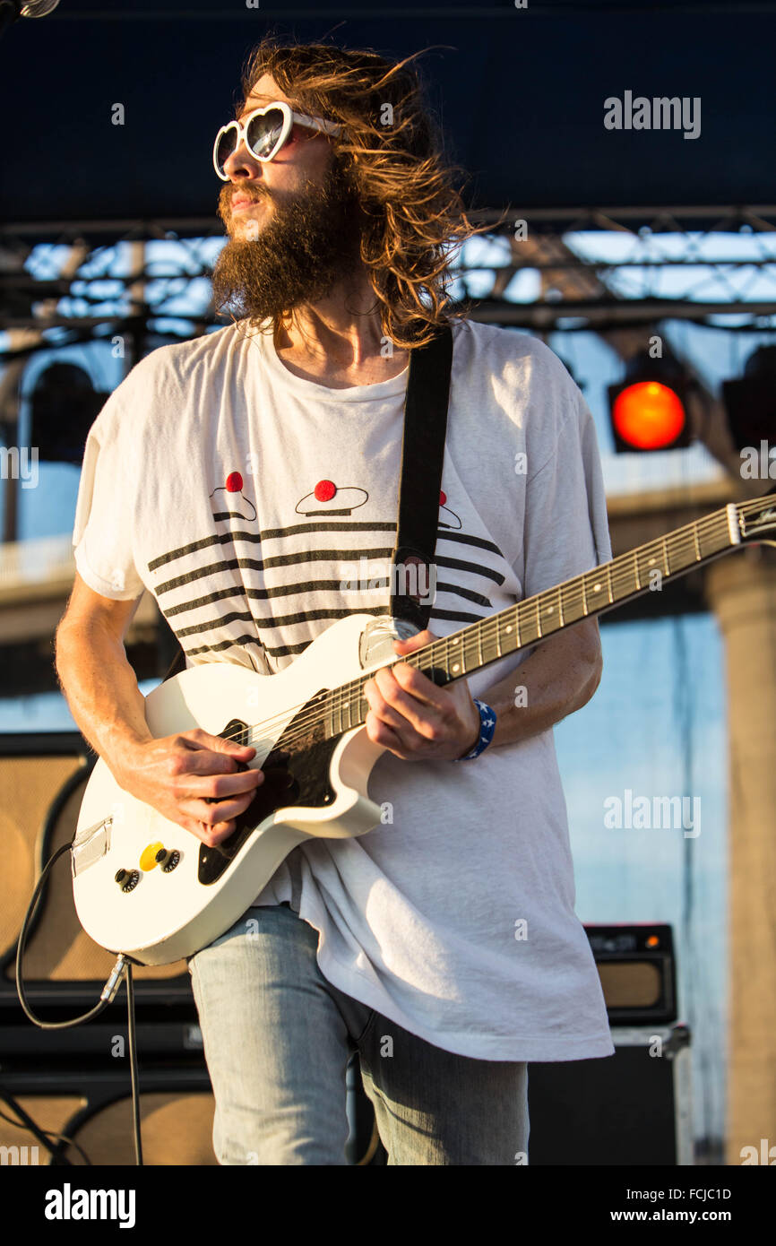 Parker Gispert playing guitar for The Whigs Stock Photo - Alamy