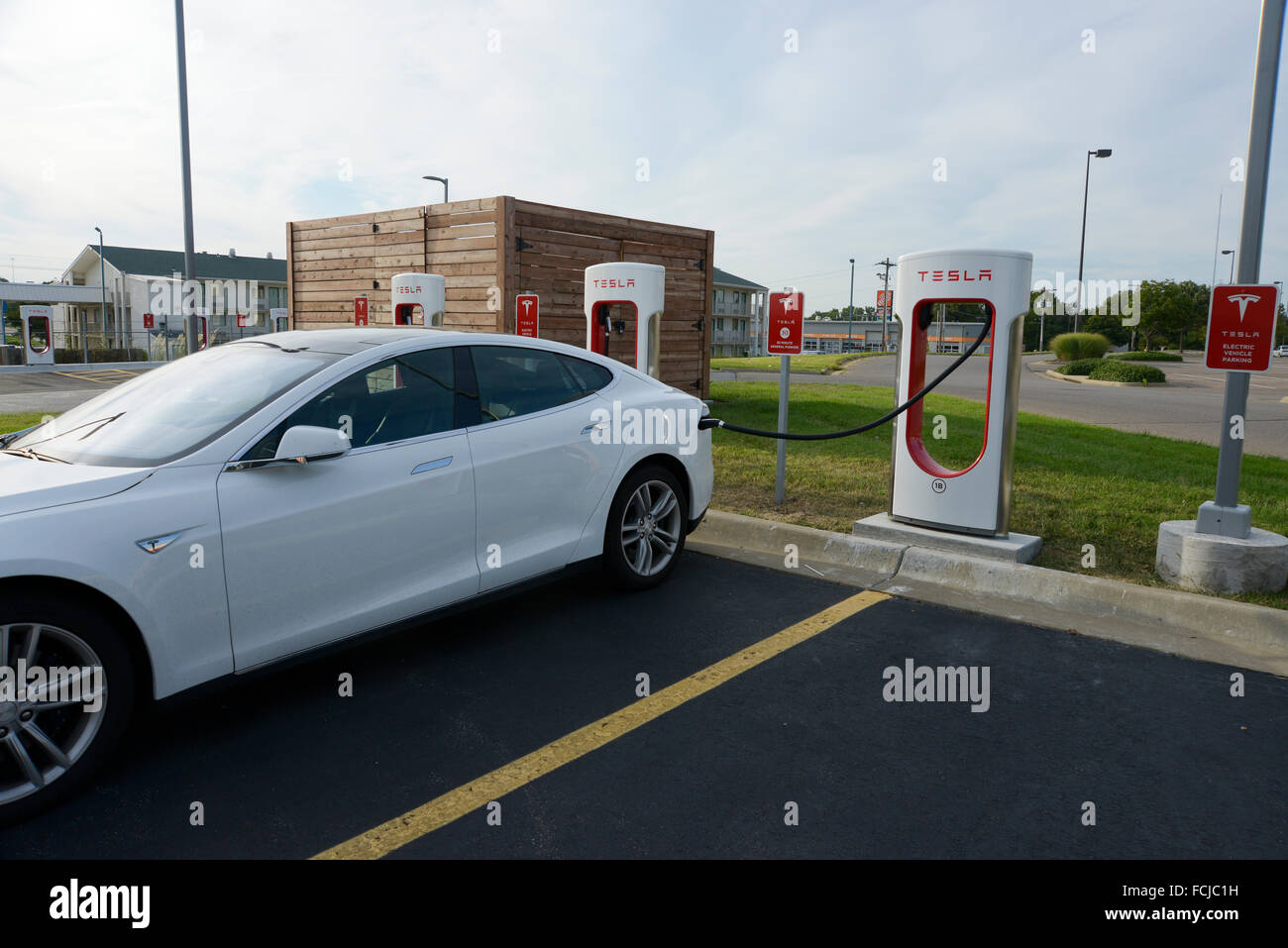 Topeka, Kansas, USA,5th September, 2015 Tesla Model S is plugged in and ...