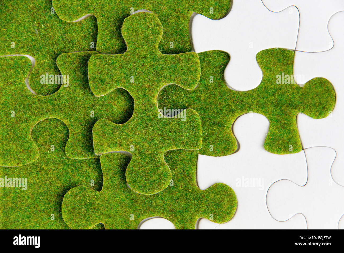 green puzzle piece Stock Photo - Alamy