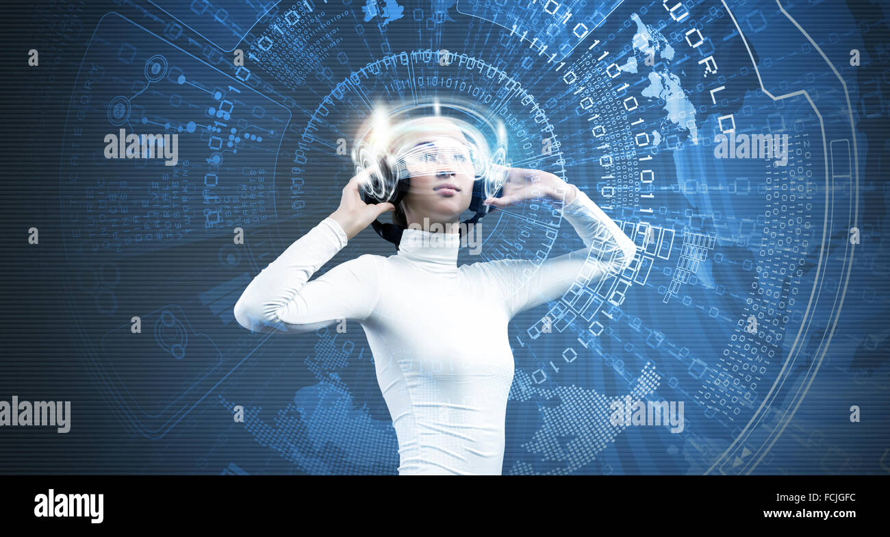 Young woman in white wearing headphones. High-tech concept Stock Photo ...
