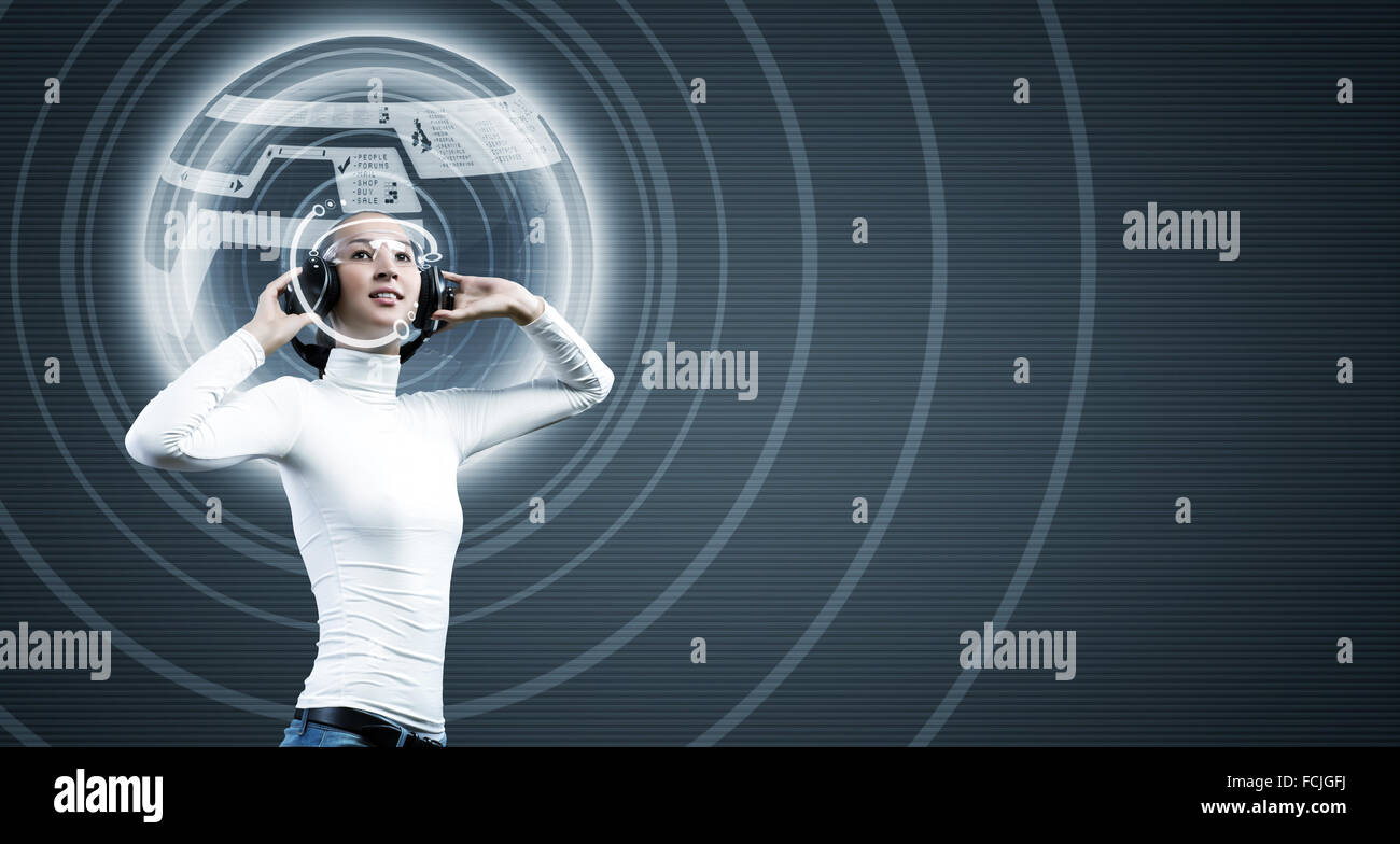 Young woman in white wearing headphones. High-tech concept Stock Photo ...