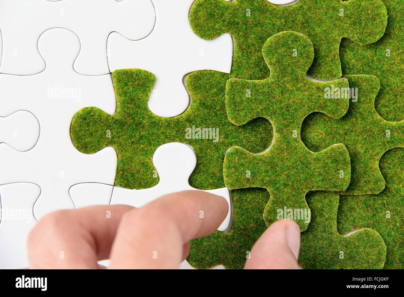 green puzzle piece Stock Photo - Alamy