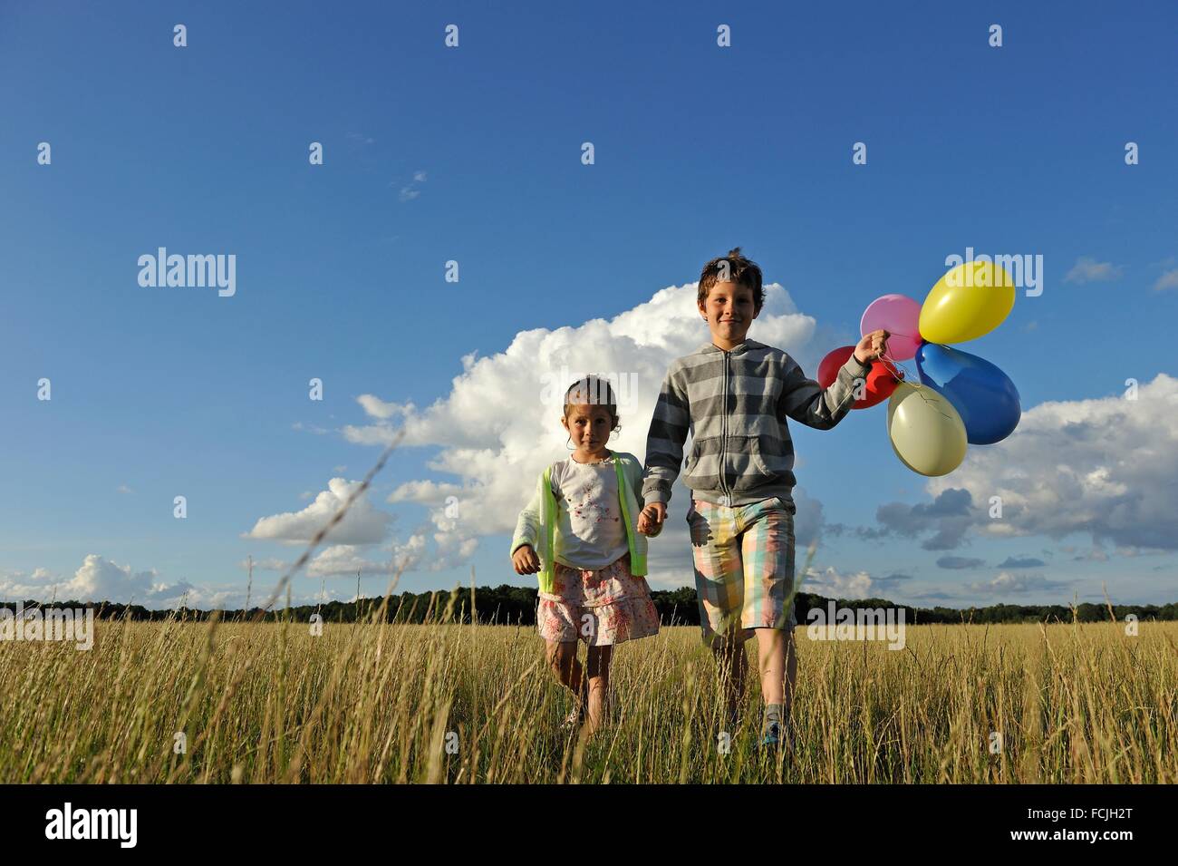 Balloon running hi-res stock photography and images - Alamy