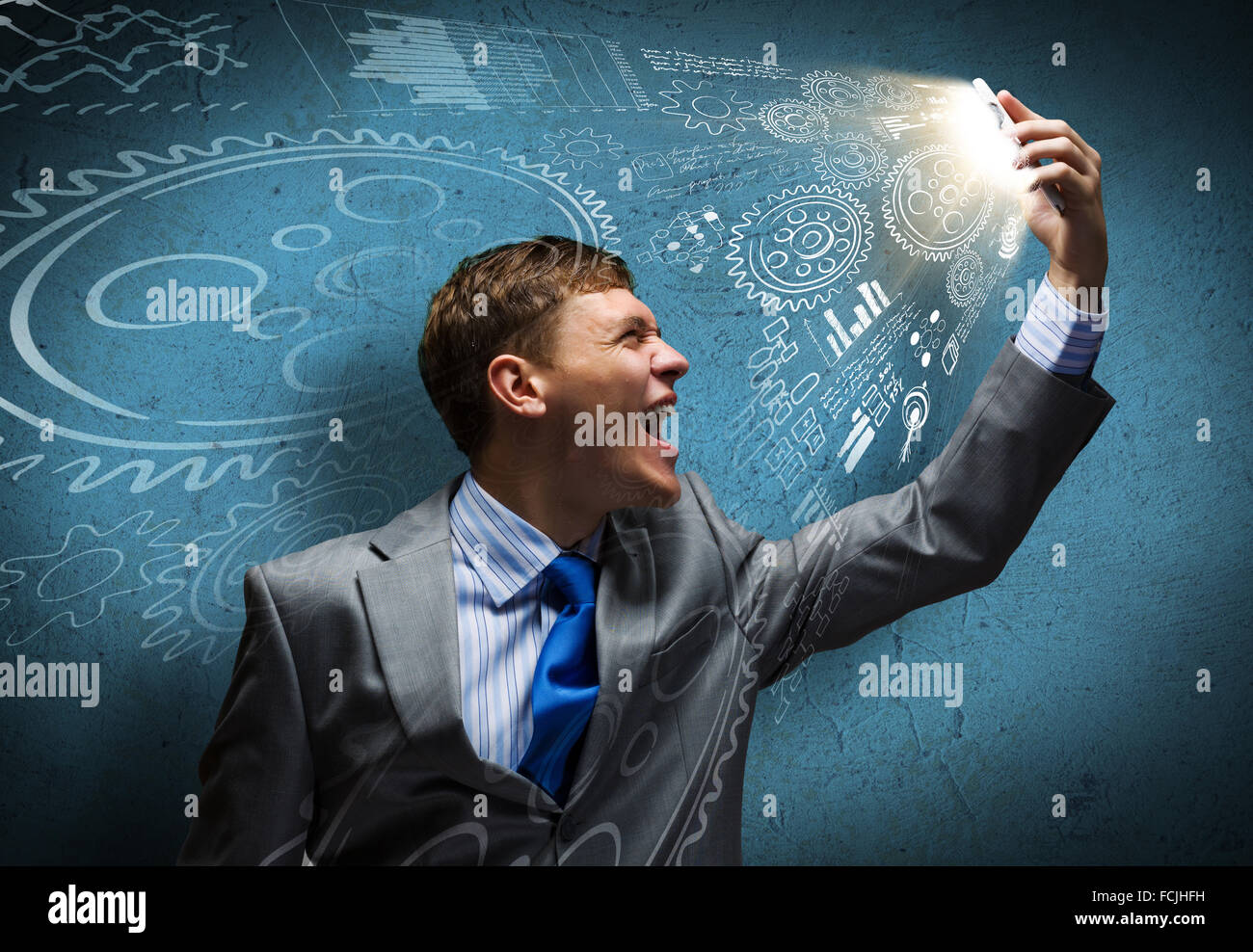 Angry businessman screaming furiously in mobile phone Stock Photo - Alamy