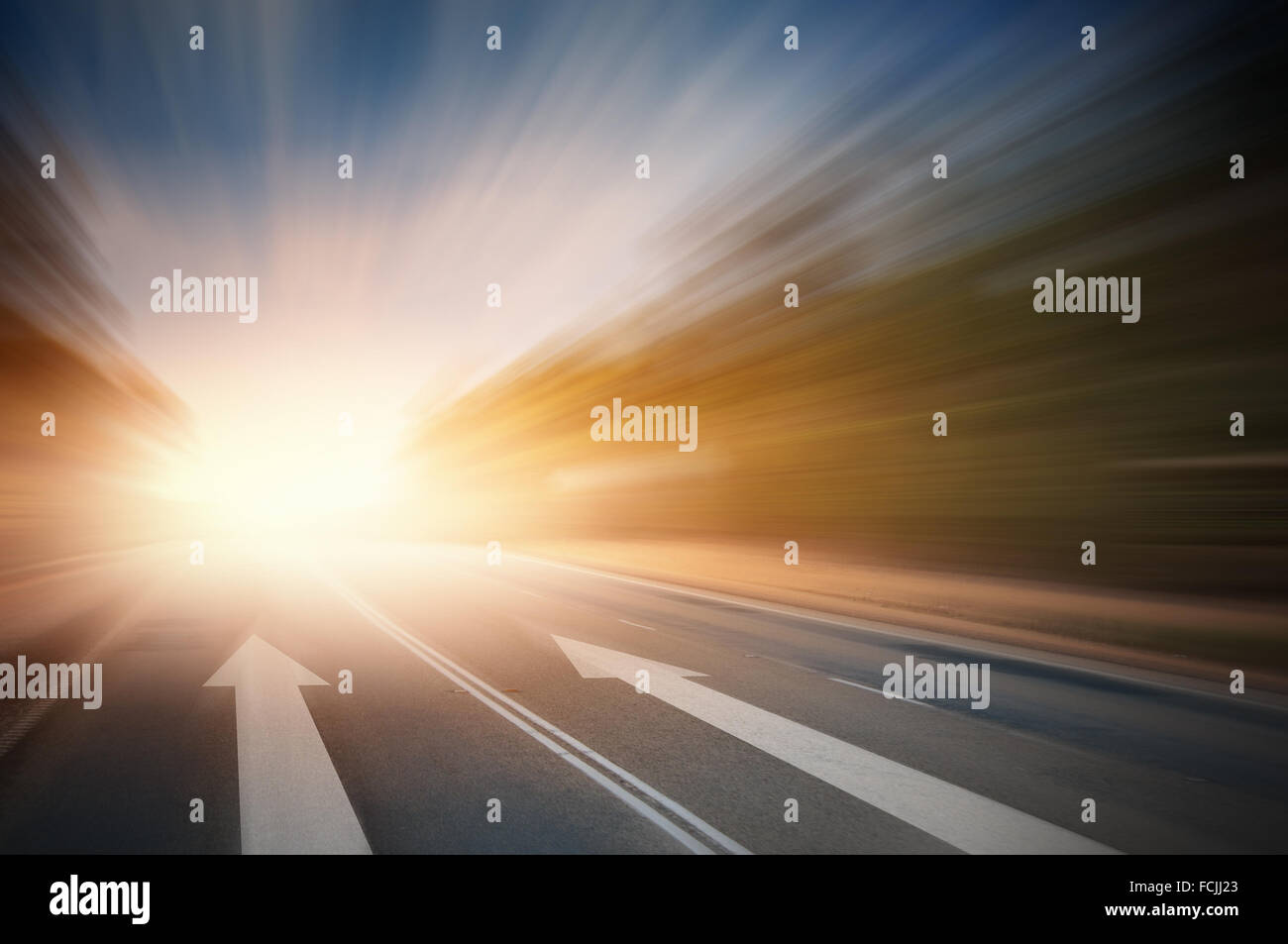 Conceptual image of asphalt road and direction arrow Stock Photo - Alamy