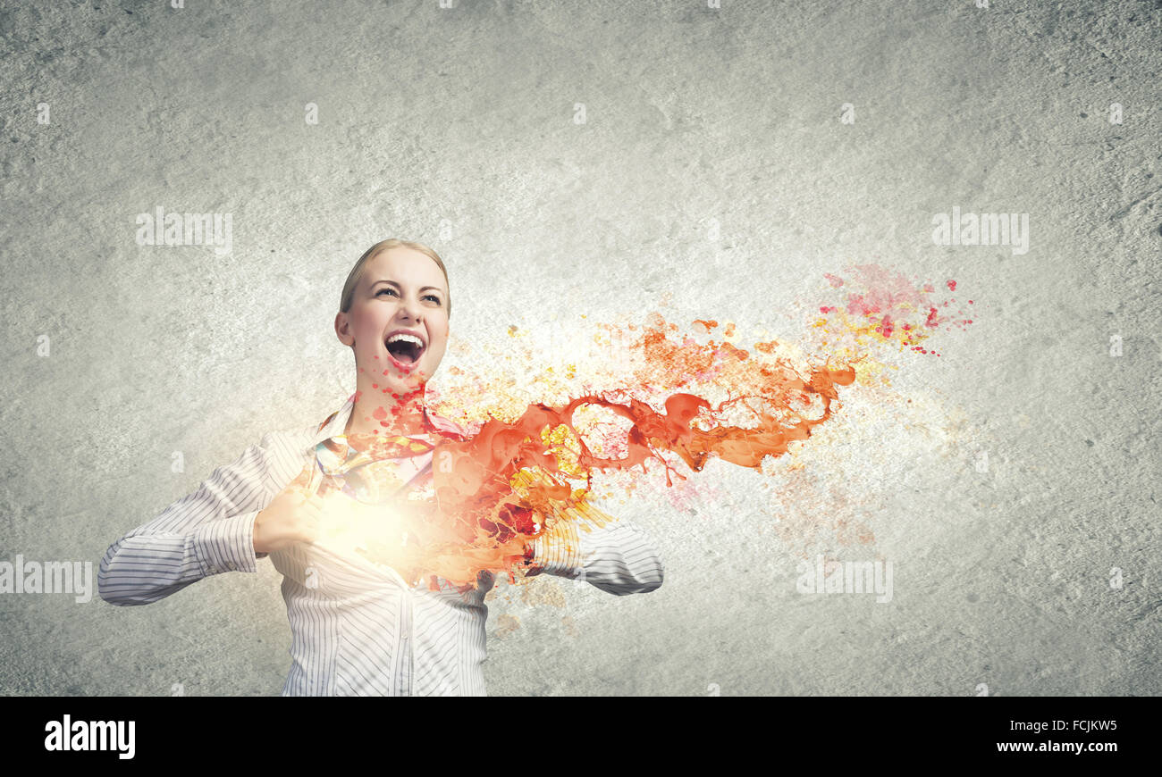 Woman tearing open shirt hi-res stock photography and images - Alamy