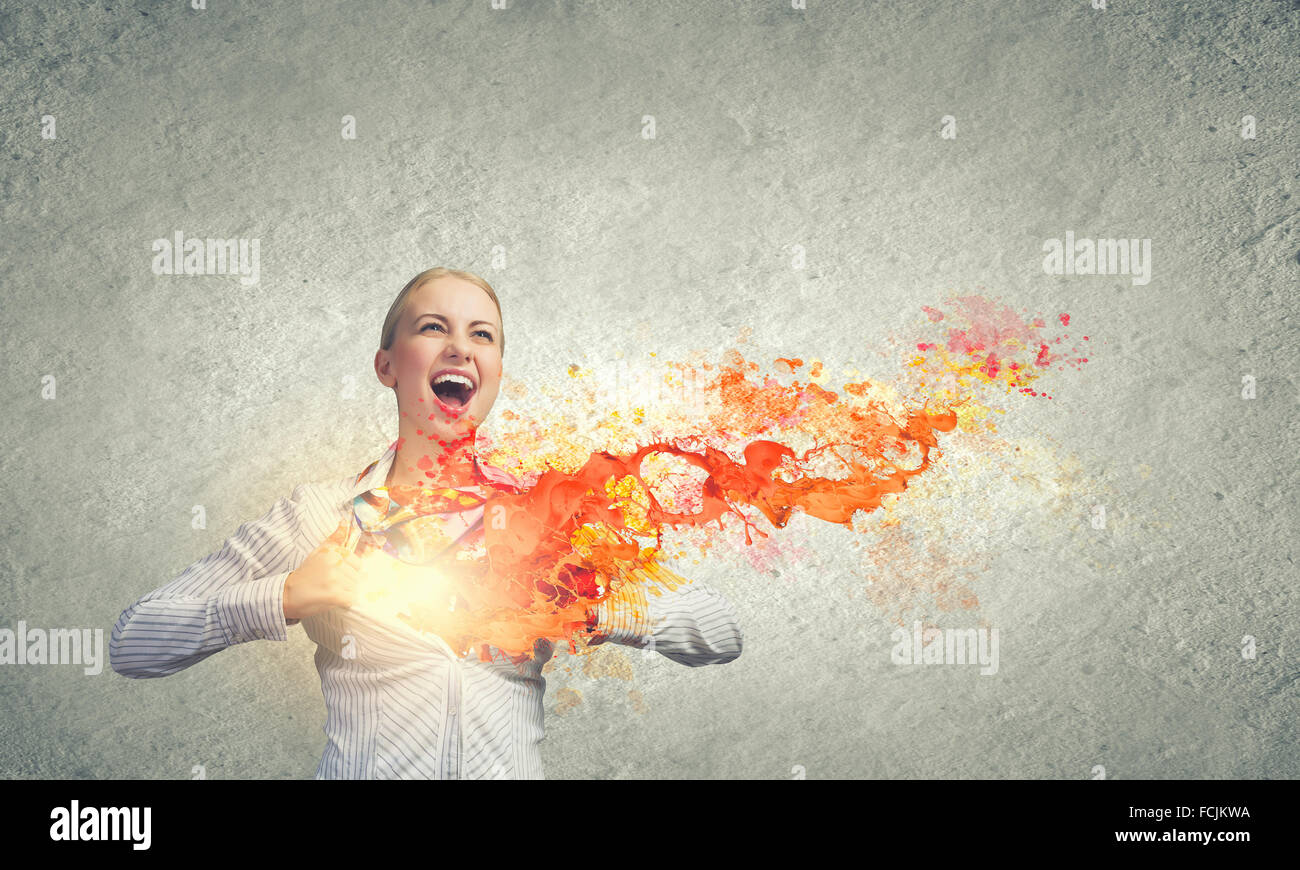 Woman tearing open shirt hi-res stock photography and images - Alamy