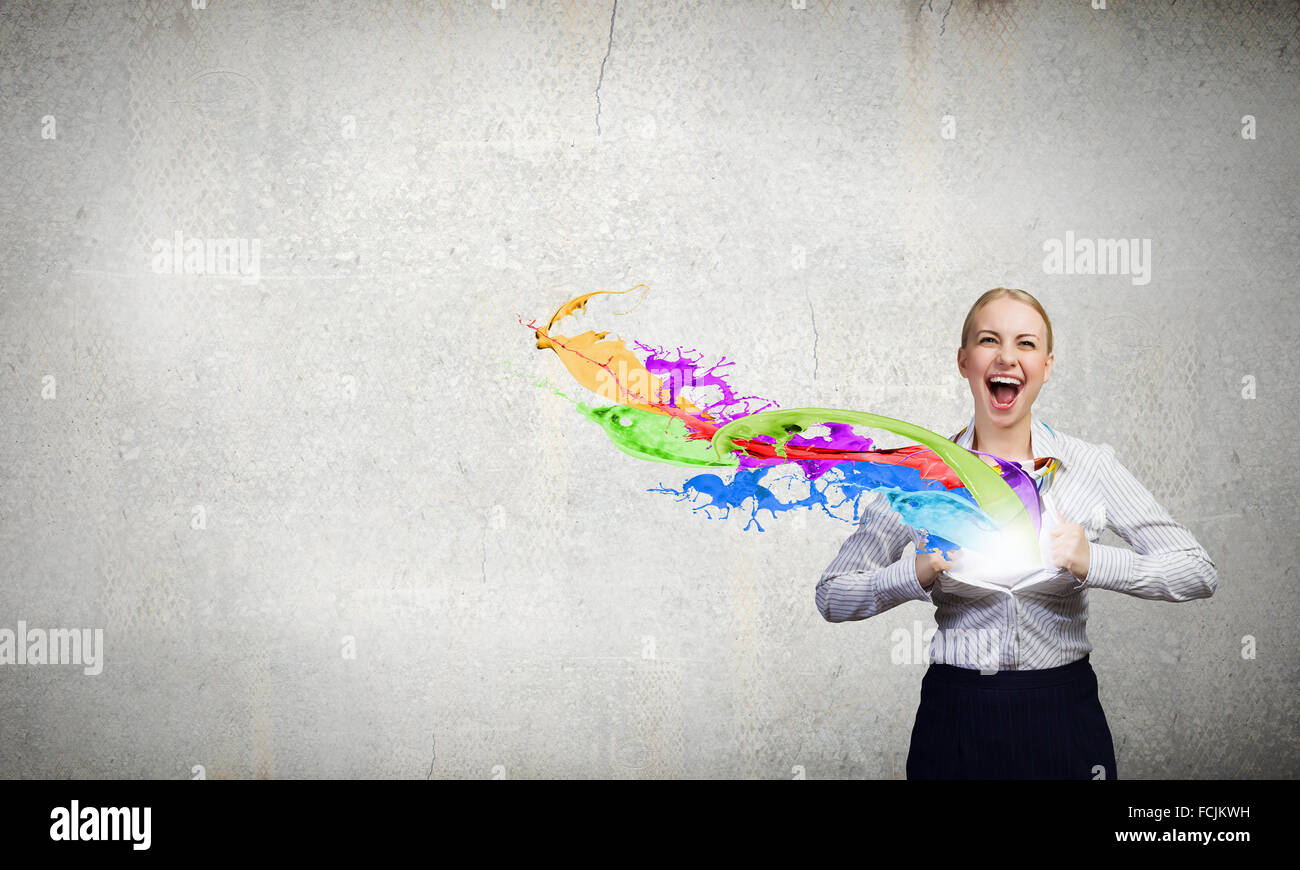 Young woman tearing shirt on chest and splashes flying out Stock Photo ...