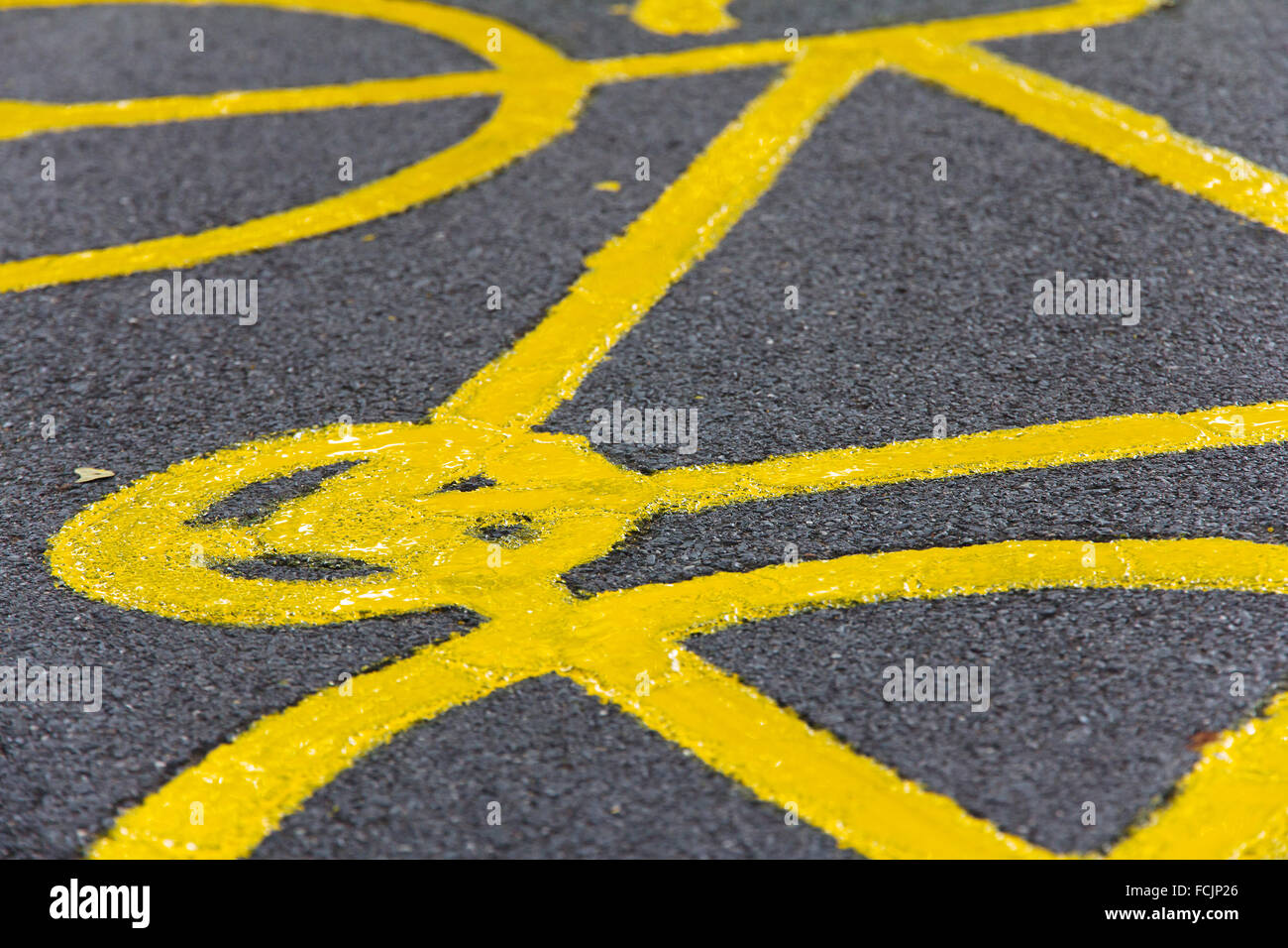 Bicycle Sign on the Ground Stock Photo - Alamy