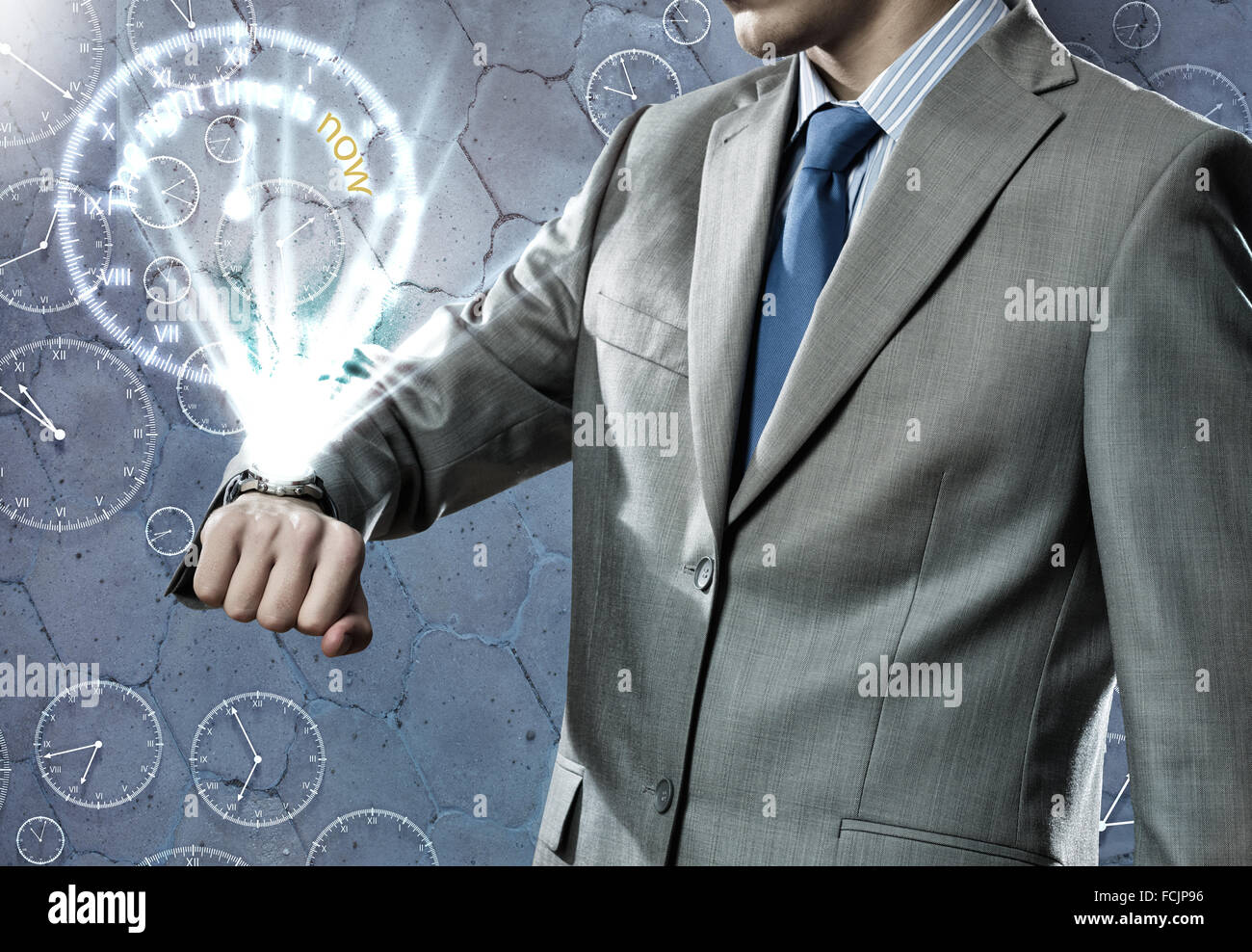 Close up of businessman looking at watch at his wrist Stock Photo - Alamy