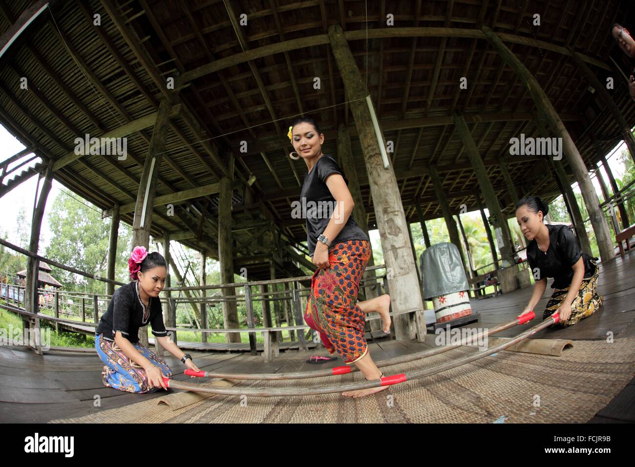 Traditional bamboo dance hi-res stock photography and images - Alamy