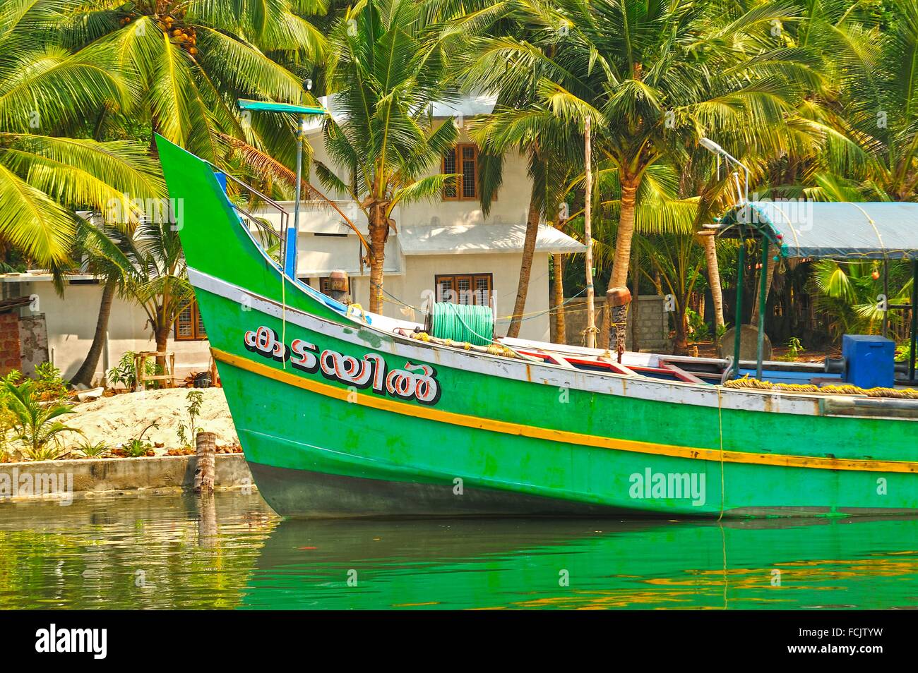 moored fishing boat in backwaters between Kollam and Cochin, Kerala ...